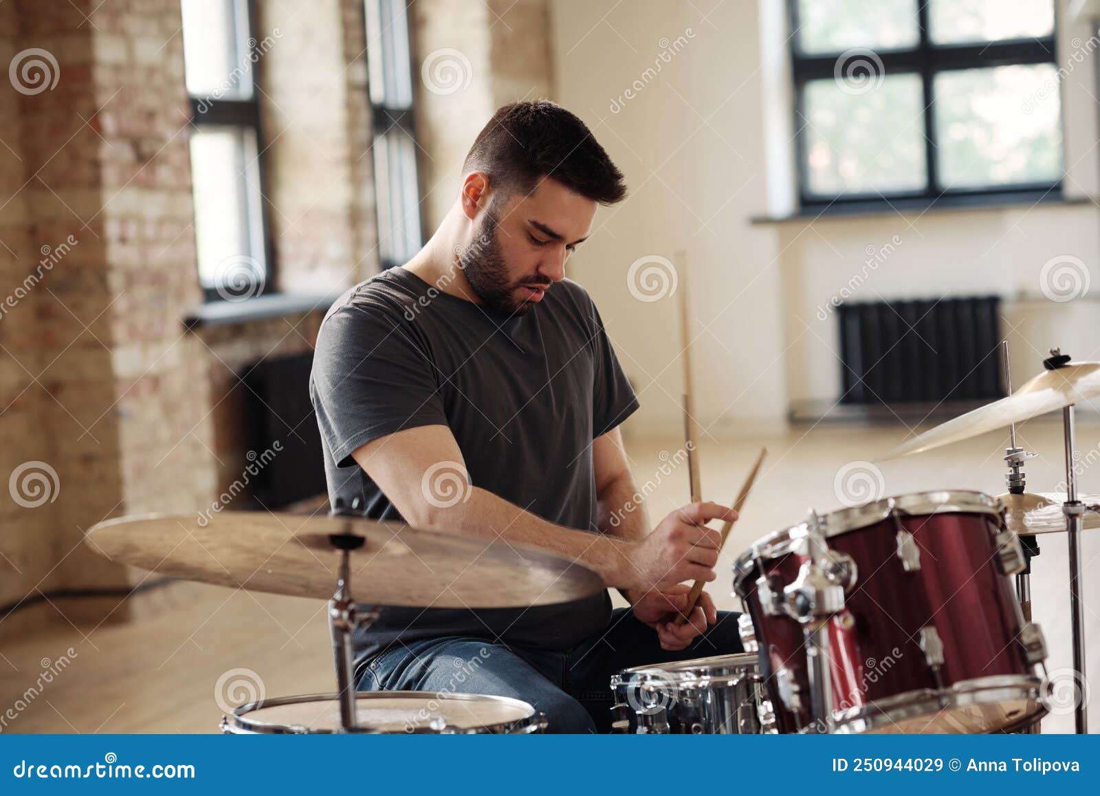 Young Man Playing Drums at Studio Stock Image - Image of musician ...