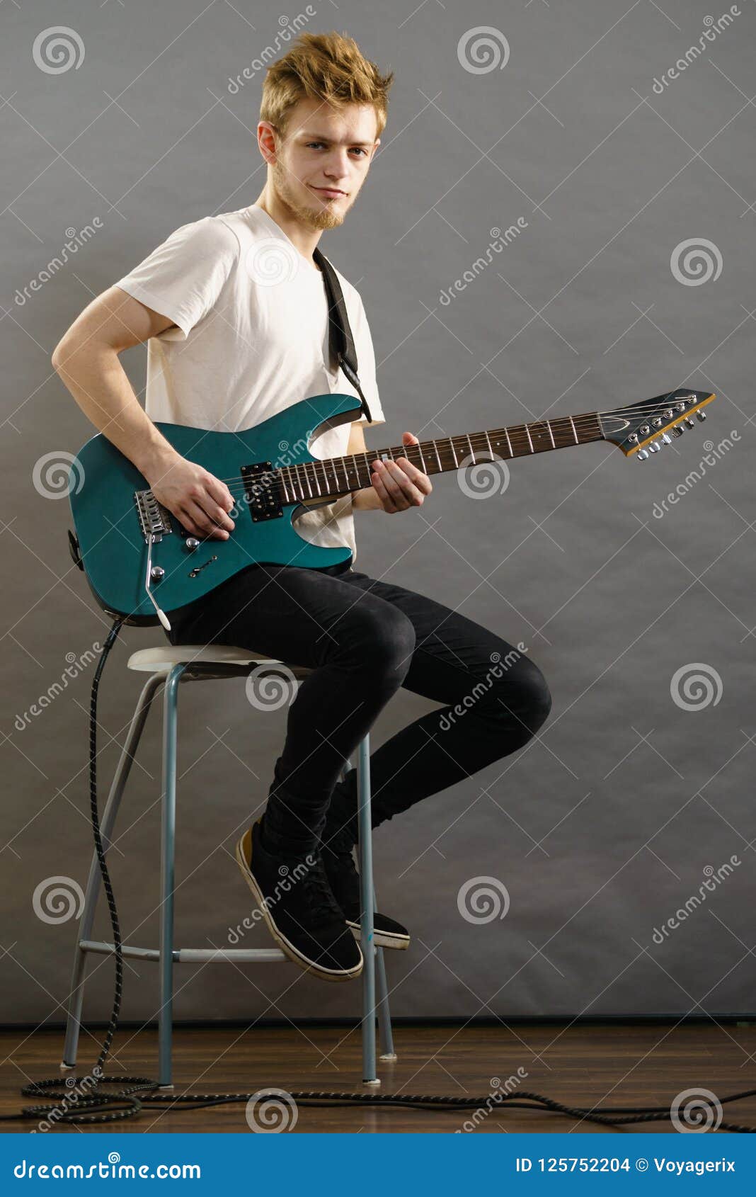 Young Man Playing Electric Guitar Stock Photo - Image of music, playing ... Young Man Playing Electric Guitar Stock Photo - Image of music, playing ...