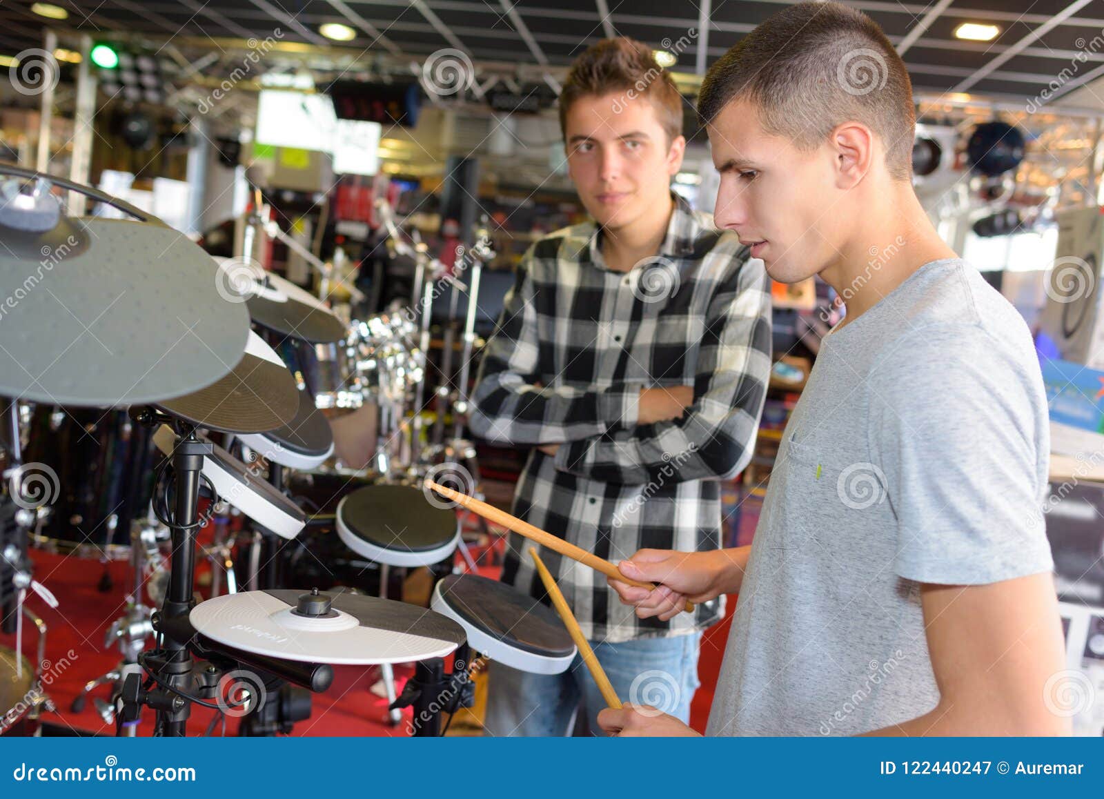 Young Man Playing Electronic Drum Set Stock Image - Image of shop ...