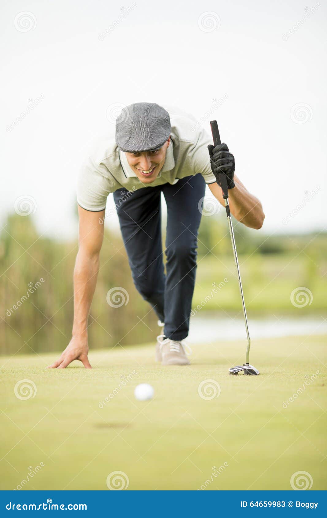 Young man playing golf stock image. Image of male, golfing - 64659983