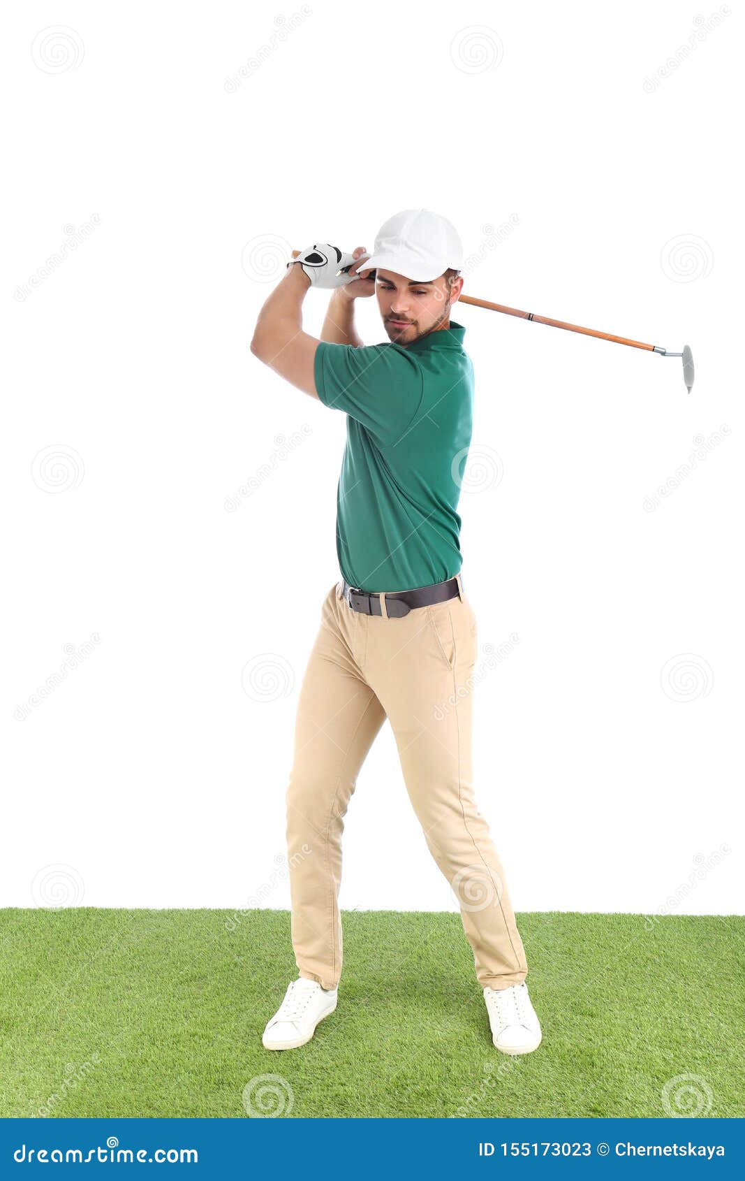 Young Man Playing Golf on Course Against White Stock Image - Image of ...