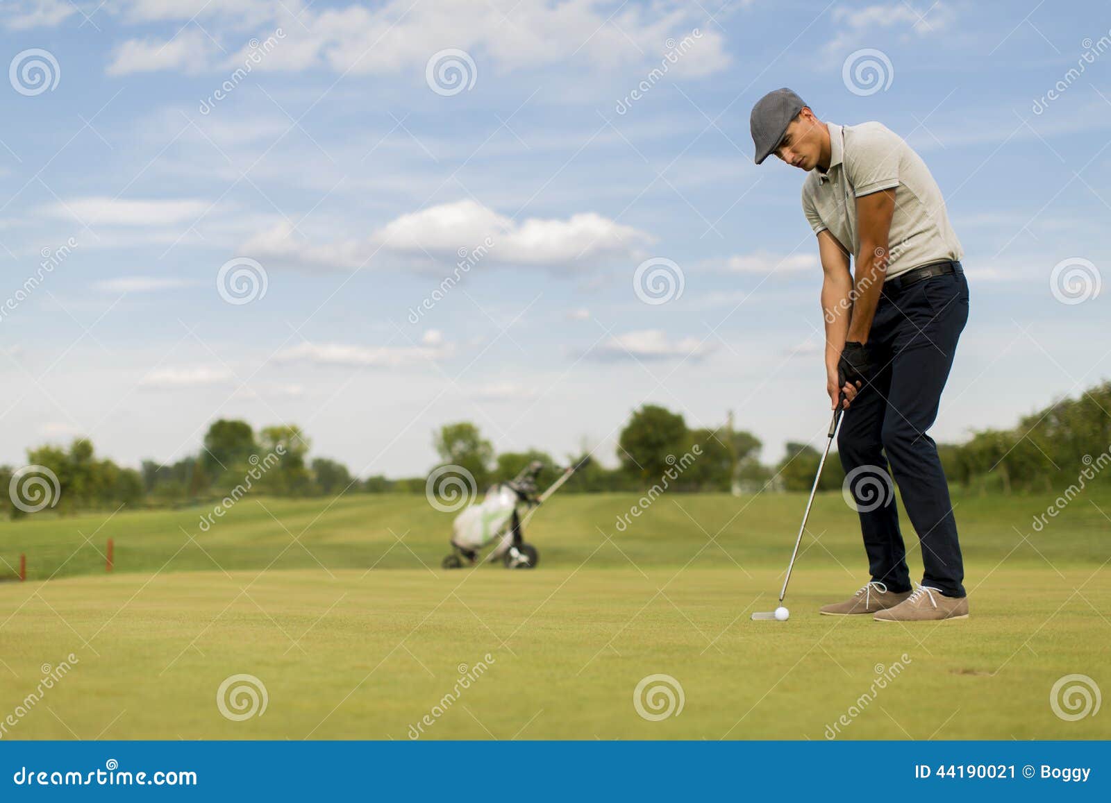 Young man playing golf stock image. Image of golf, club - 44190021