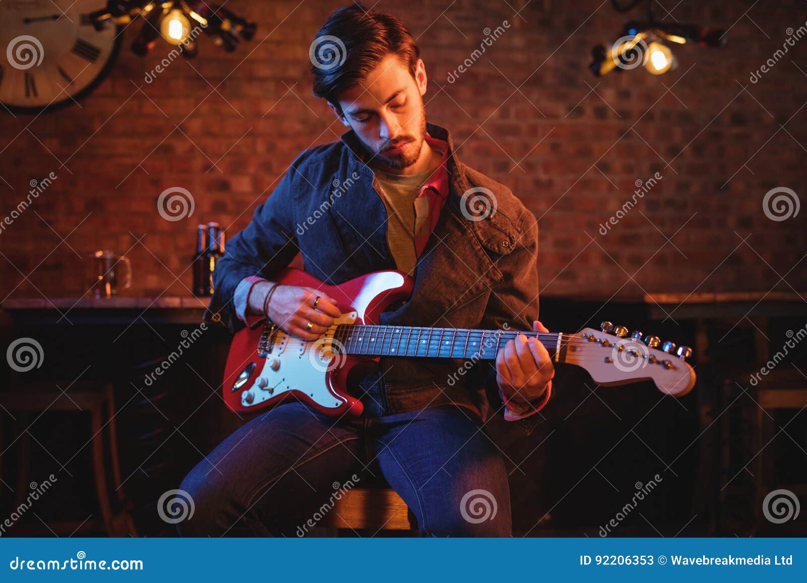 Young man playing guitar stock image. Image of life, leisure - 92206353