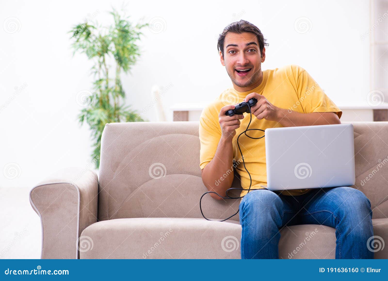 Young Man Playing Joystick Games at Home Stock Photo - Image of ...
