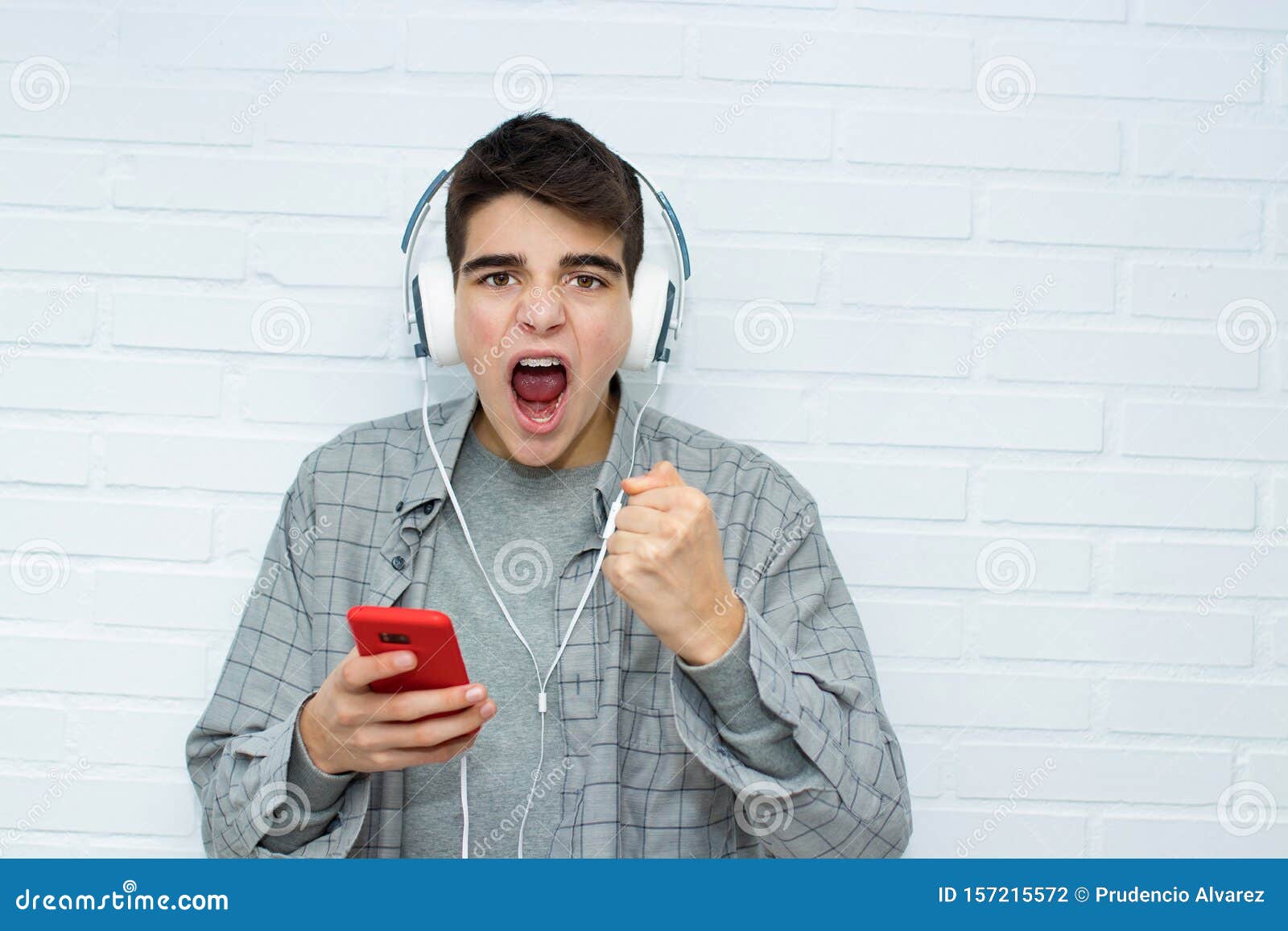 Man Playing with Mobile Phone Stock Photo - Image of isolated, looking ...