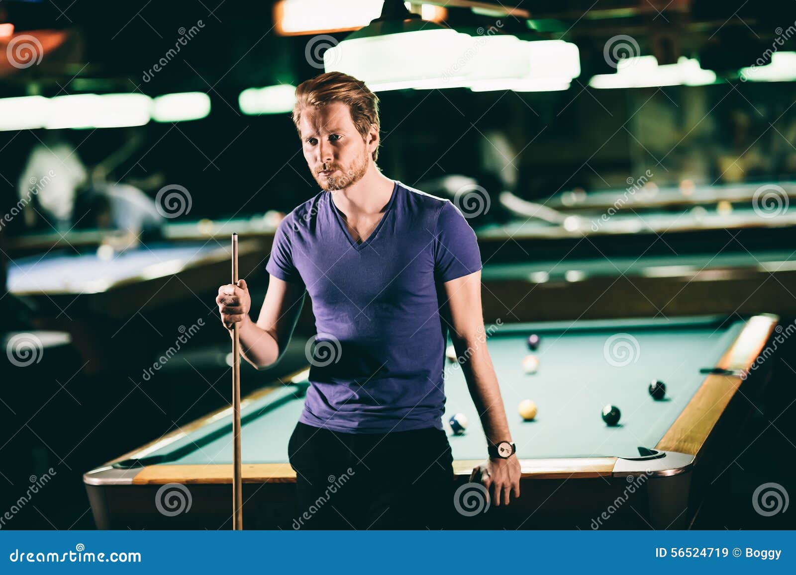 Young man playing pool stock image. Image of enjoyment - 56524719