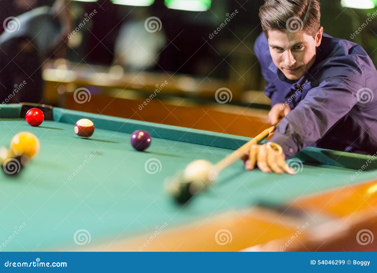 Young man playing pool stock image. Image of billiard - 54046299