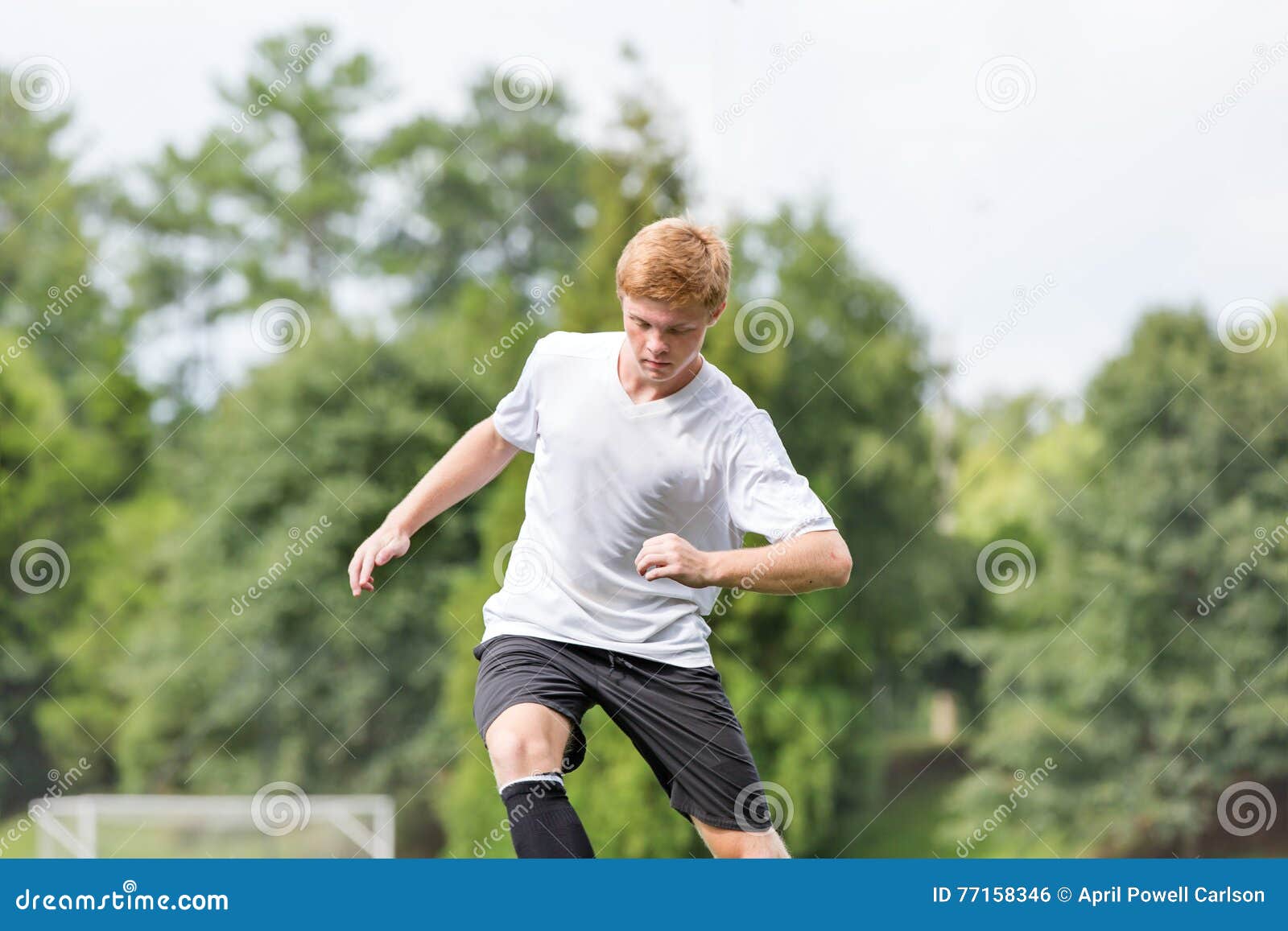 Young Man Playing Soccer - Doing a Soccer Move Stock Photo - Image of ...