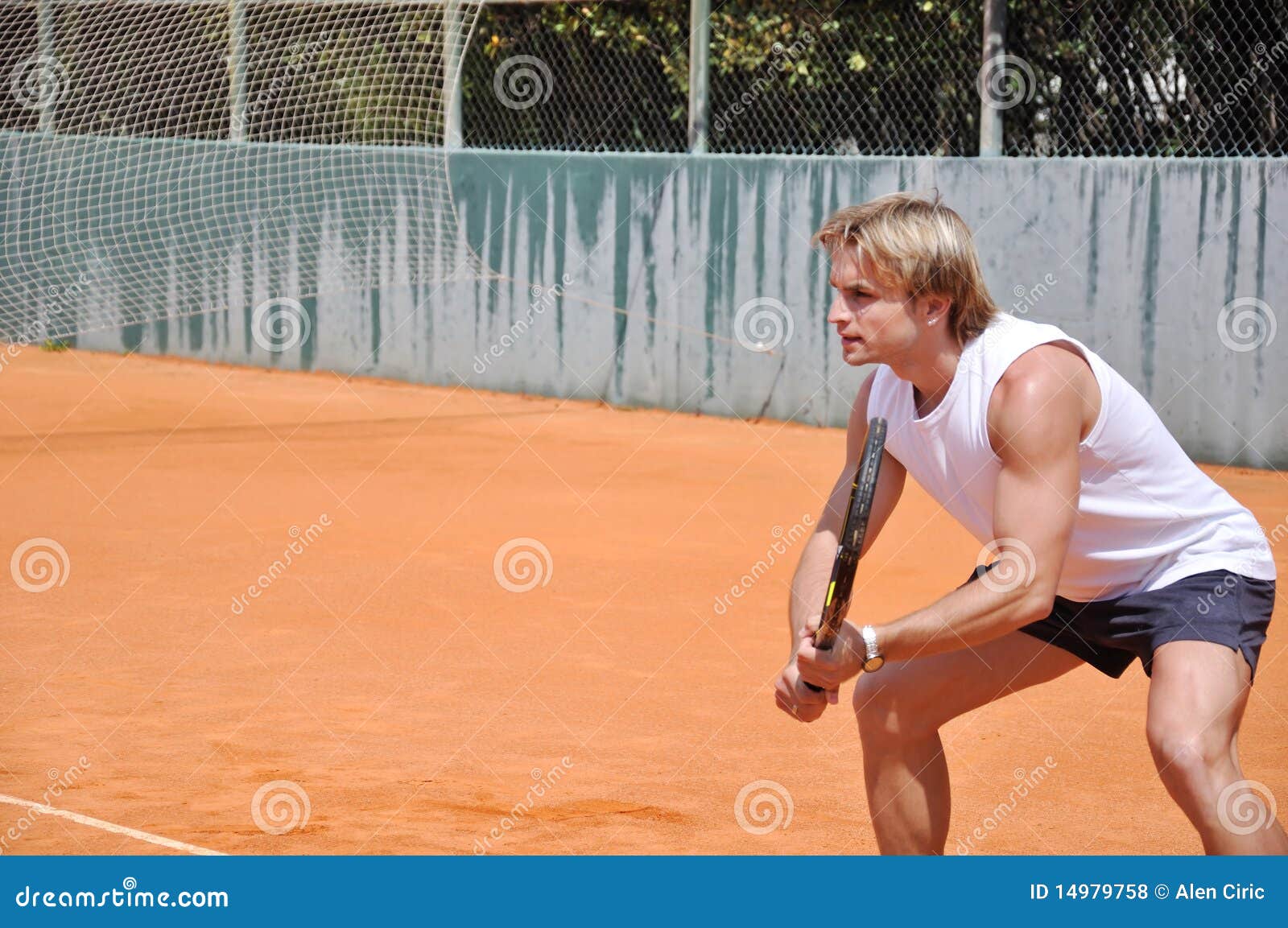 Young man playing tennis stock photo. Image of exercising - 14979758