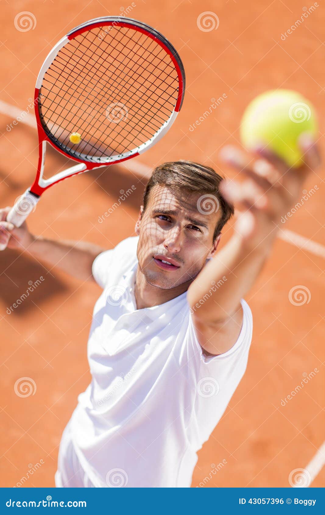 Young man playing tennis stock photo. Image of activity - 43057396