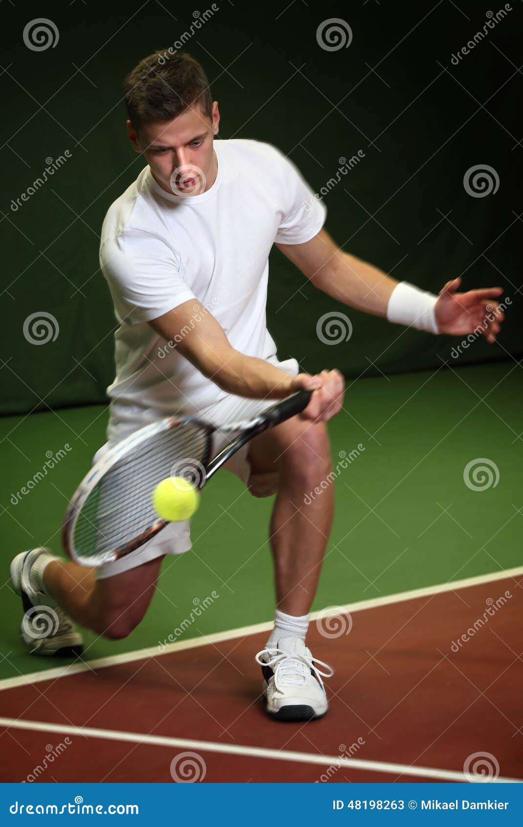 Young man playing tennis stock image. Image of competition - 48198263