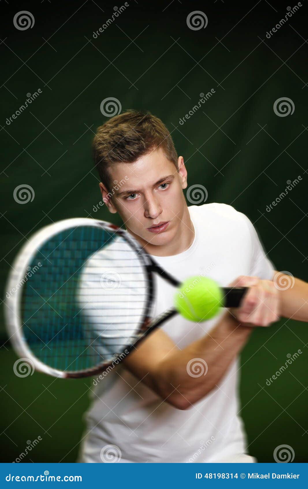 Young man playing tennis stock photo. Image of hitting - 48198314