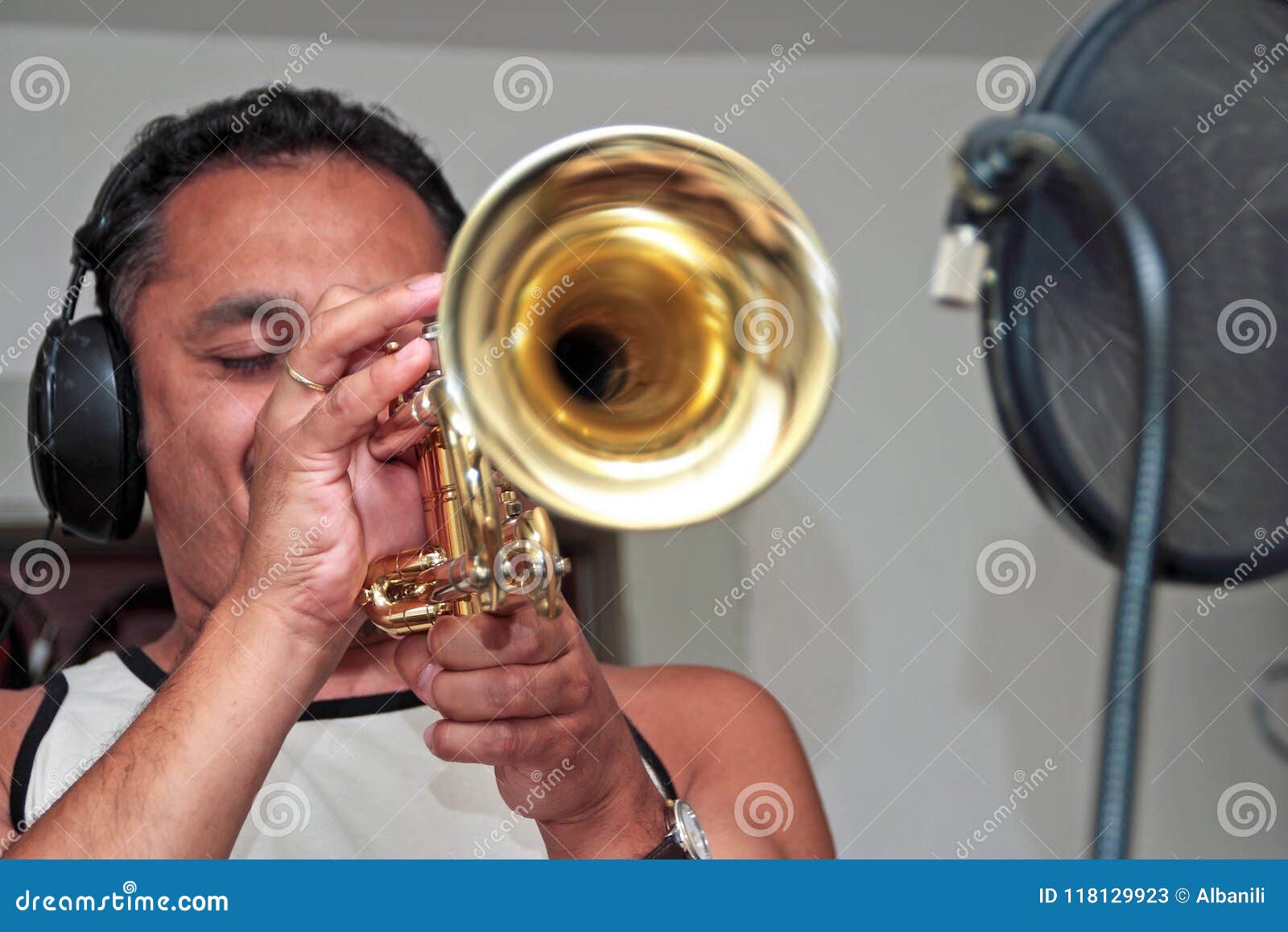 Young Man Playing Trumpet in Studio Stock Image - Image of composition ...