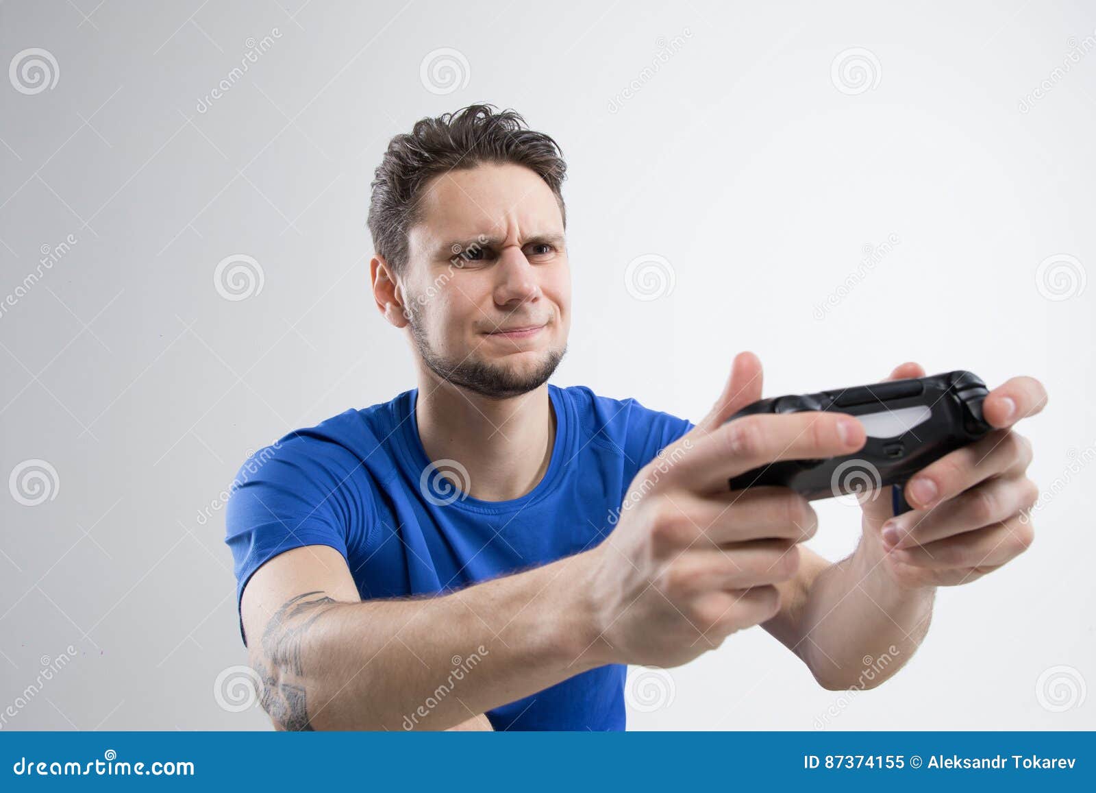 Young Man Playing Video Games in Black Shirt Isolated Studio Stock ...