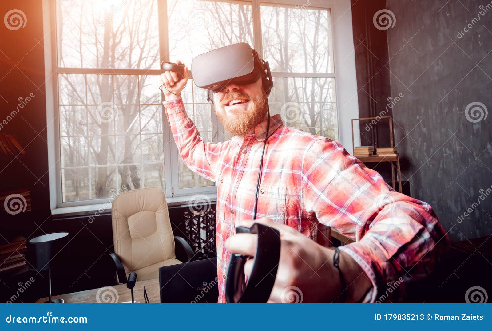 The Young Man Plays a Game at the Office. Stock Image - Image of ...