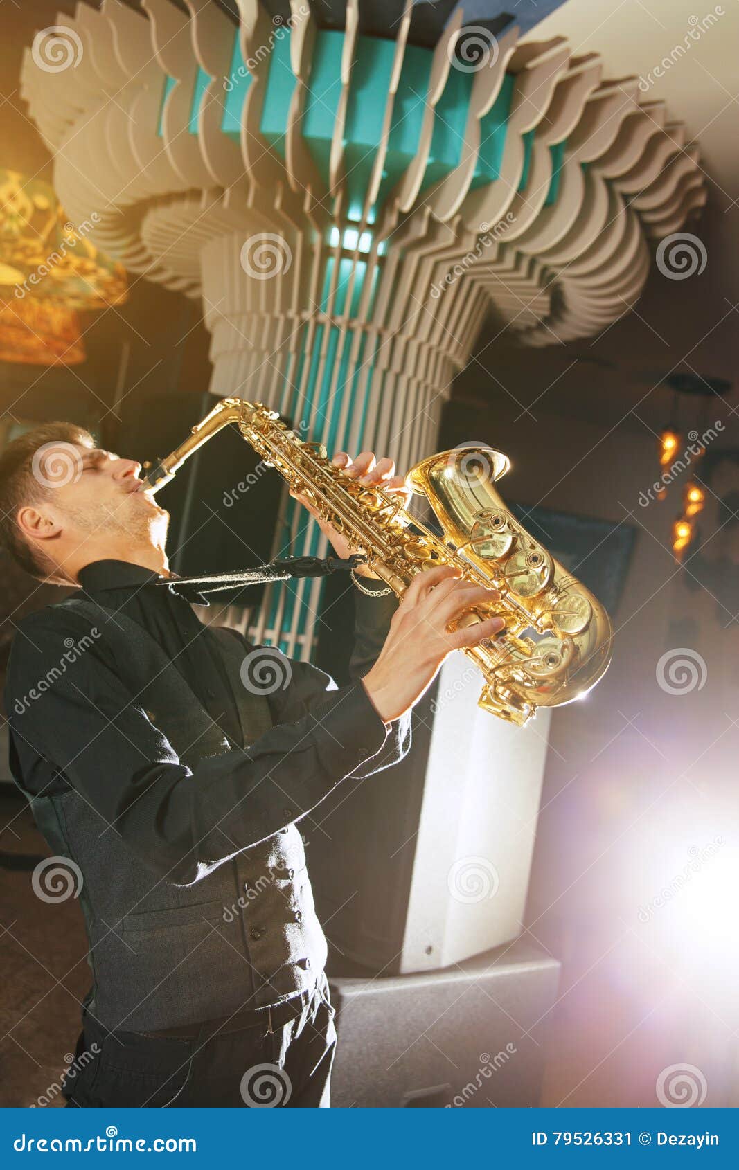 Young Man Plays a Musical Instrument Saxophone Stock Image - Image of ...