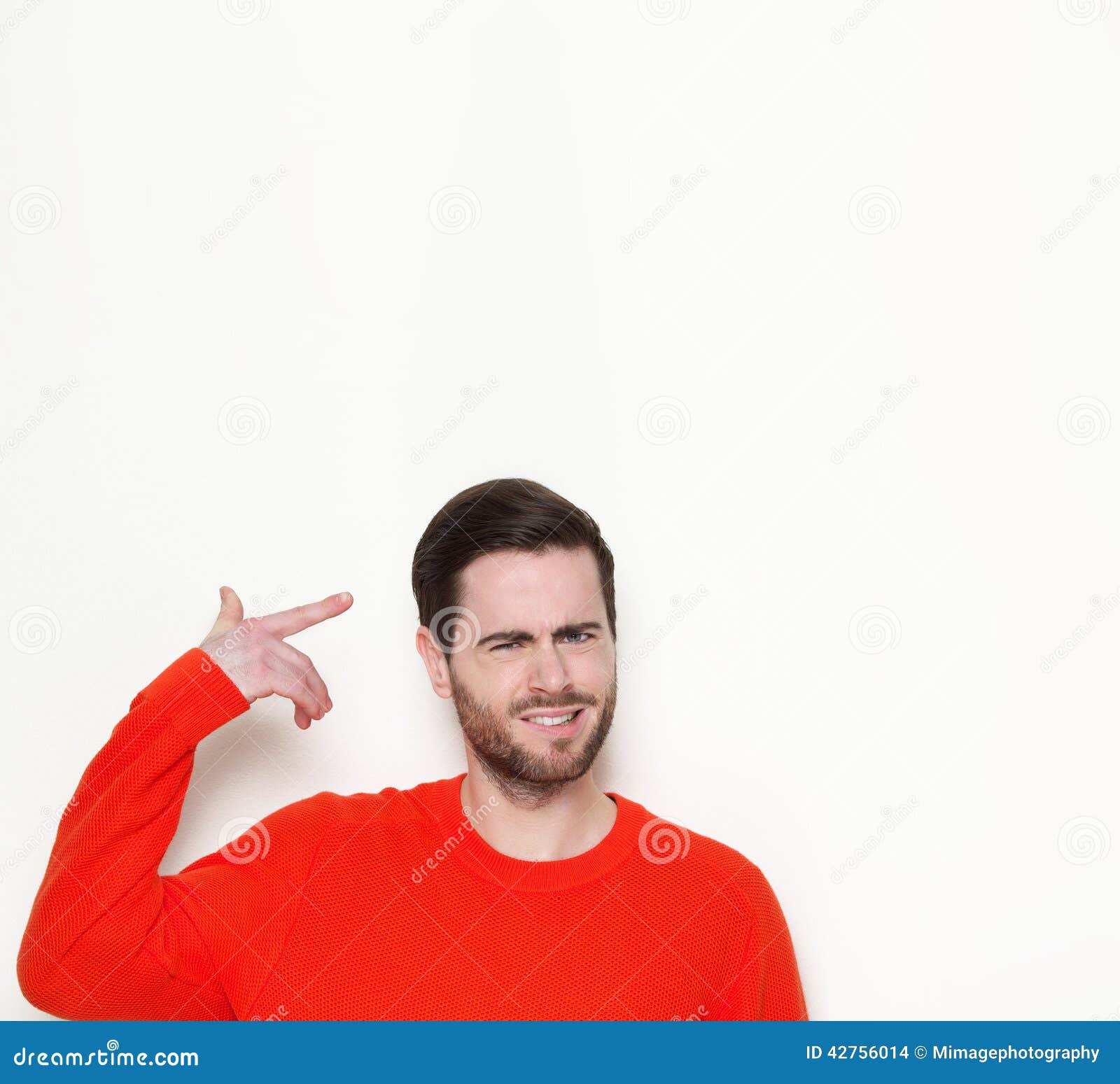 Young Man Pointing Finger To Head Stock Photo - Image of cool, gesture ...