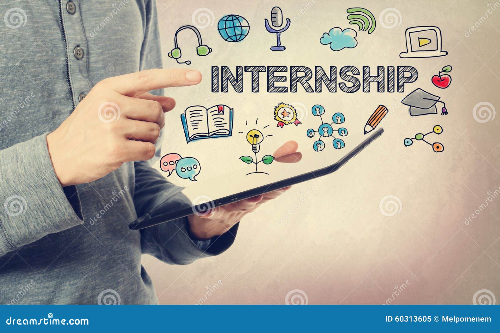Young Man Pointing at Internship Concept Over a Tablet Stock Image ...