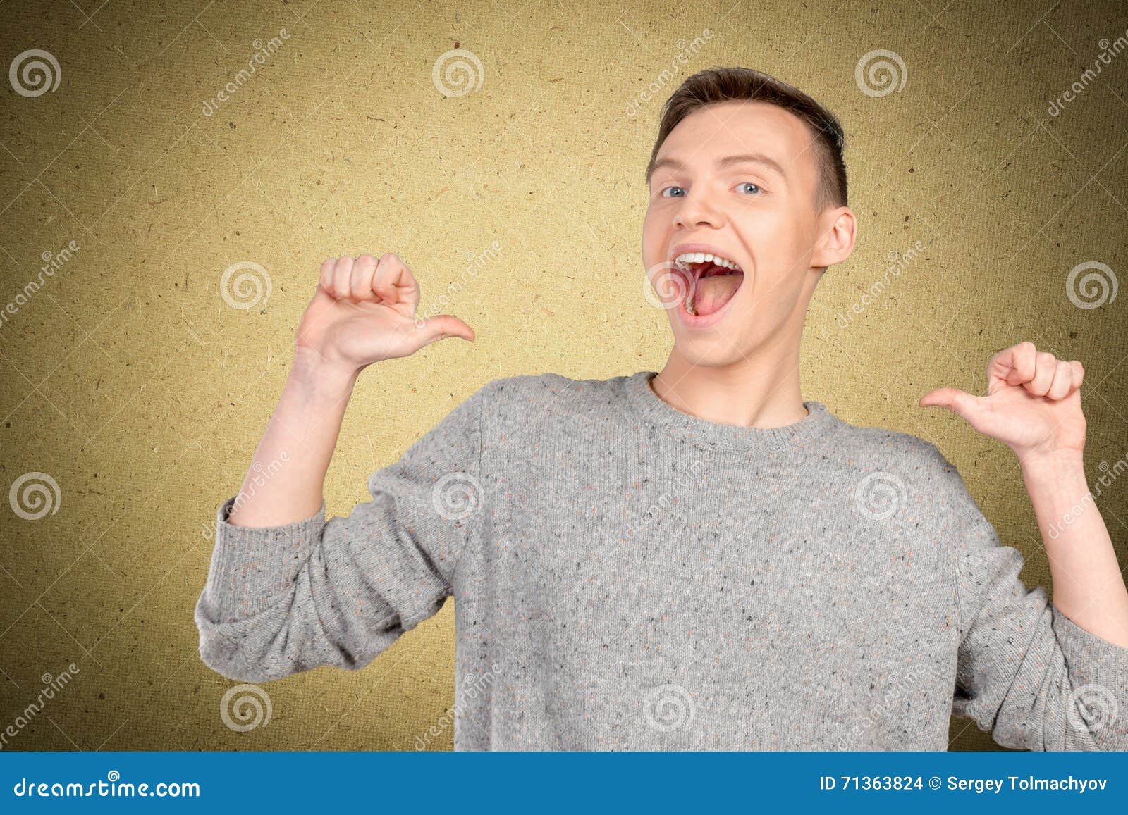 Young man pointing itself stock photo. Image of finger - 71363824