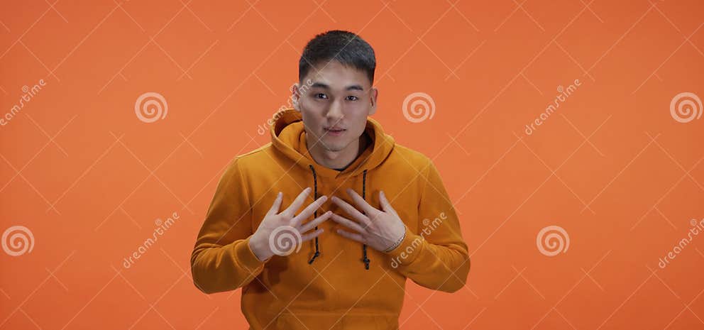 Young Man Politely Avoiding Stock Photo - Image of studio, isolated ...