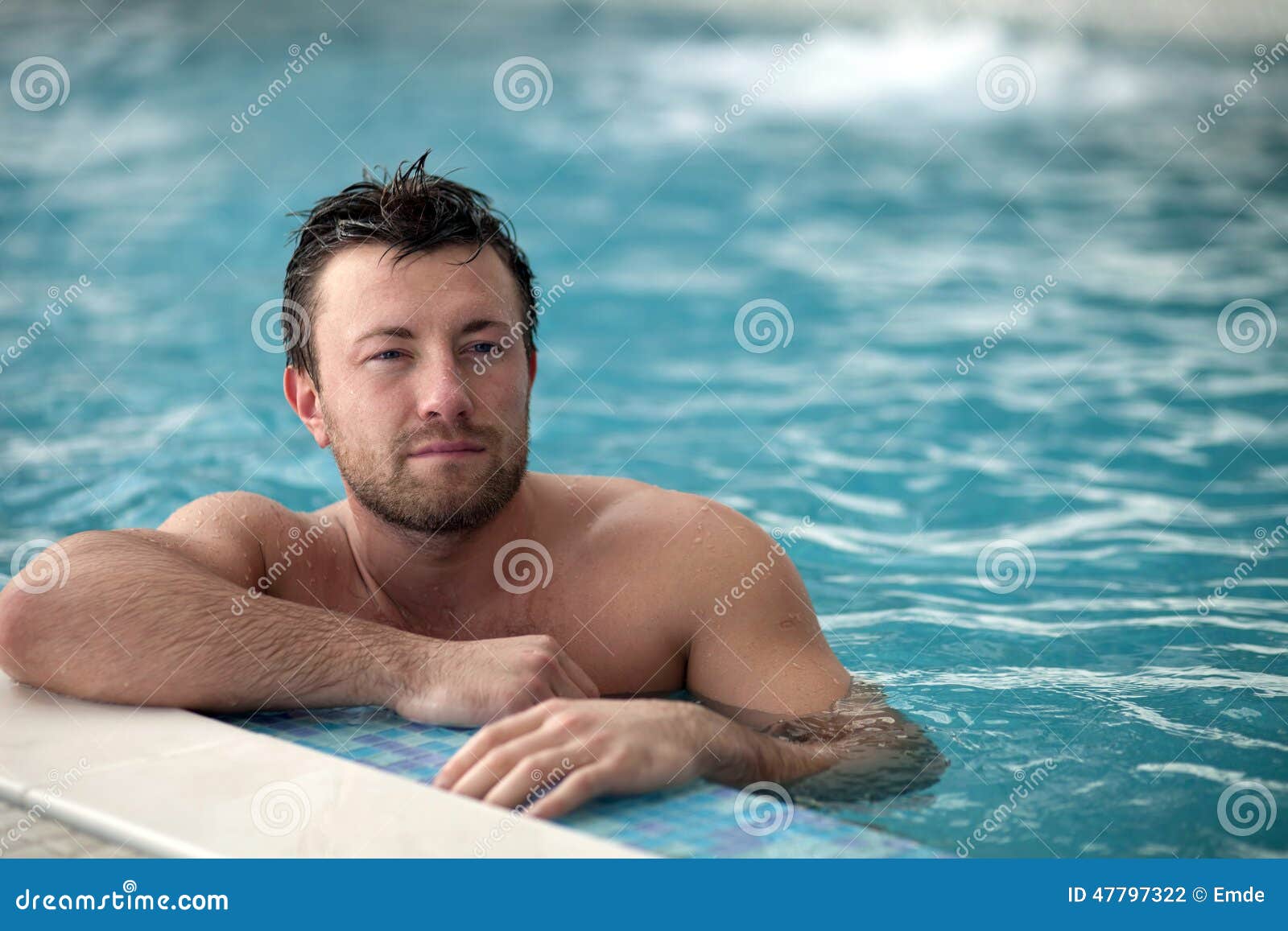 Young man in the pool stock photo. Image of active, outdoor - 47797322