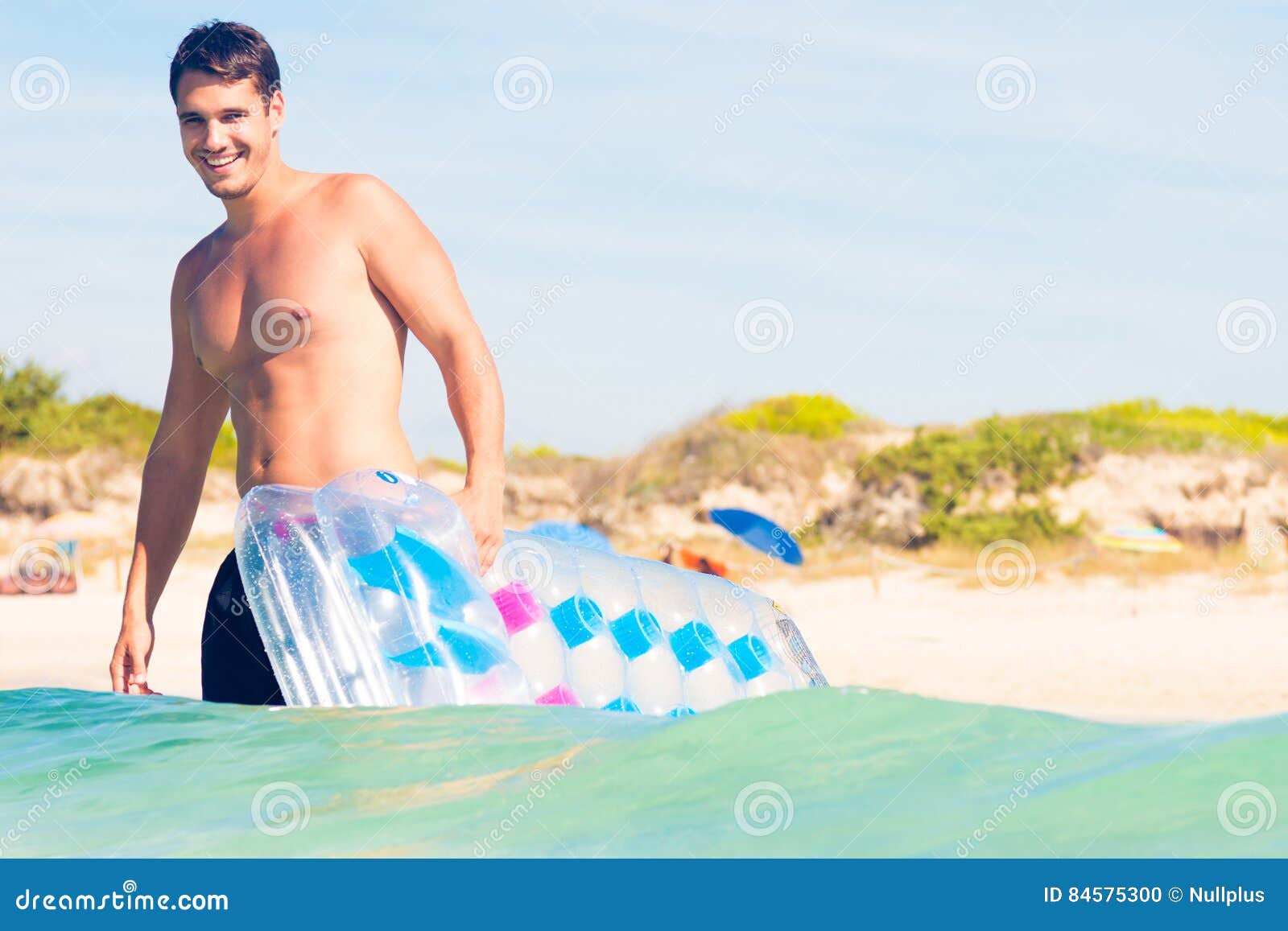 Young Man with Pool Raft stock photo. Image of water - 84575300