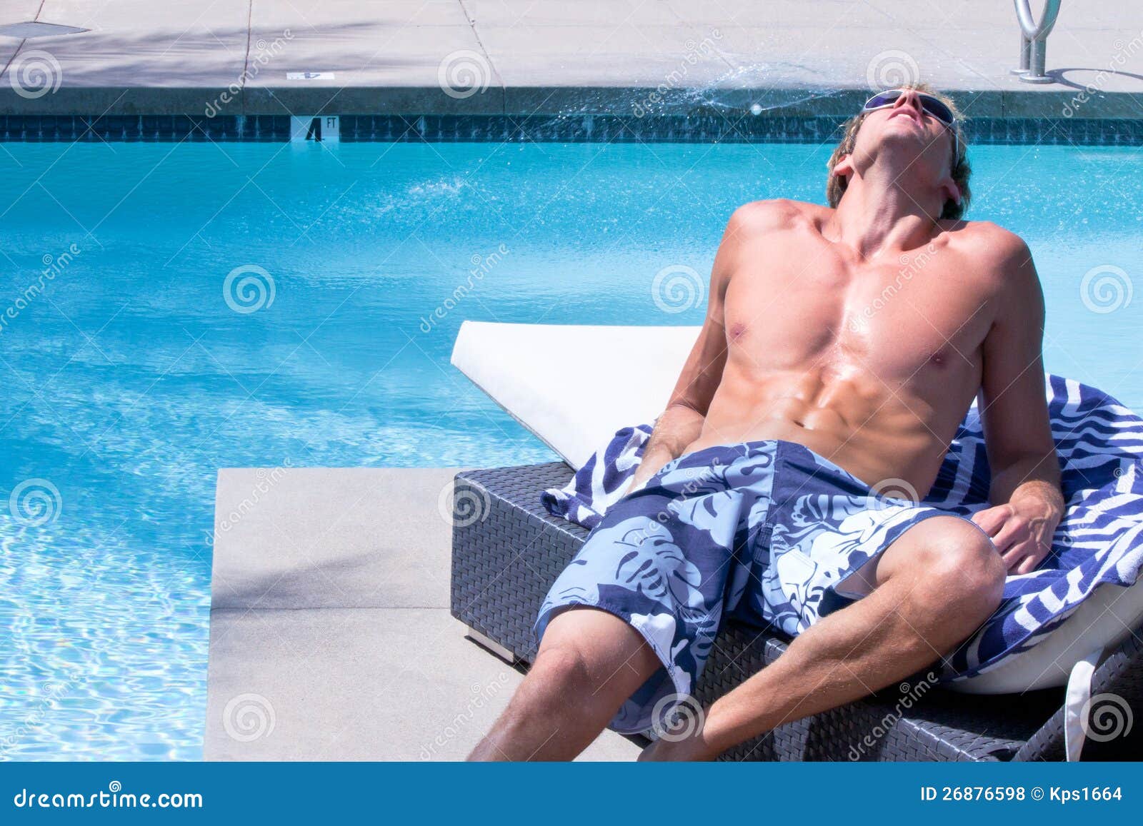 Young Man by Pool Sunbathing Stock Photo - Image of leisure, body: 26876598
