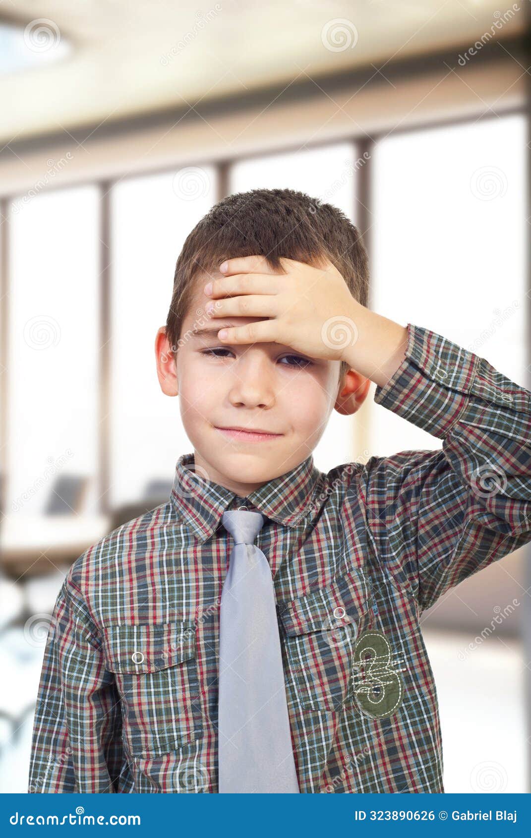 Young Man Poses with His Hand on His Head Stock Photo - Image of glance ...