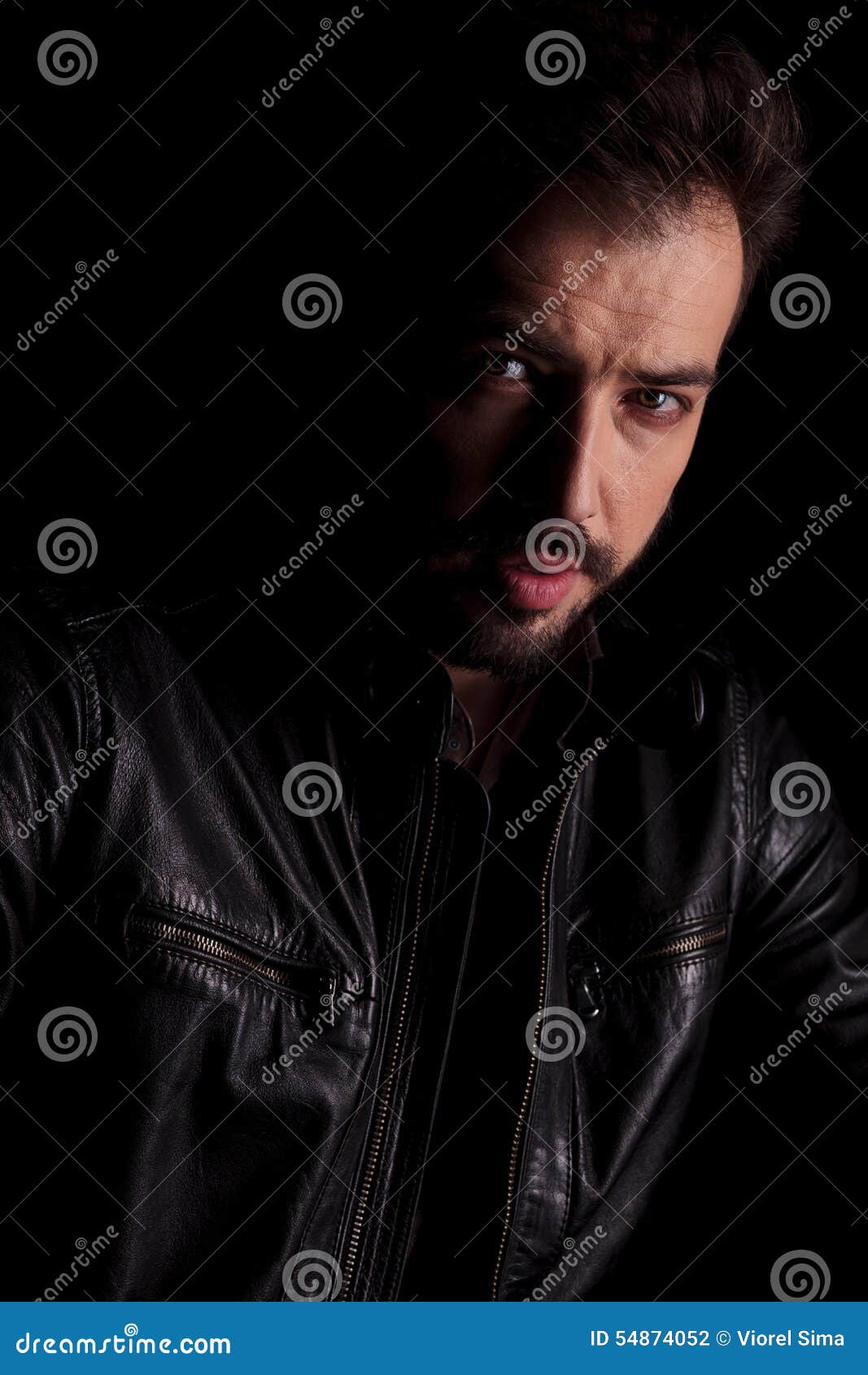 Young Man Posing on Dark Studio Background. Stock Photo - Image of hair ...