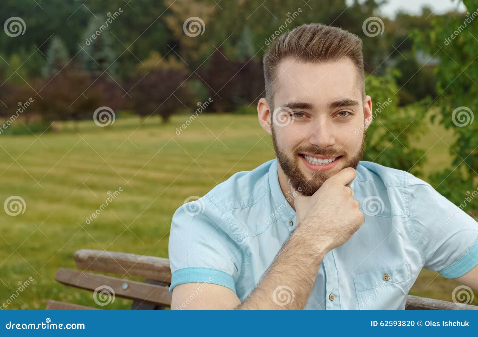 Young Man Posing on Park Bench Stock Photo - Image of male, hipster ...