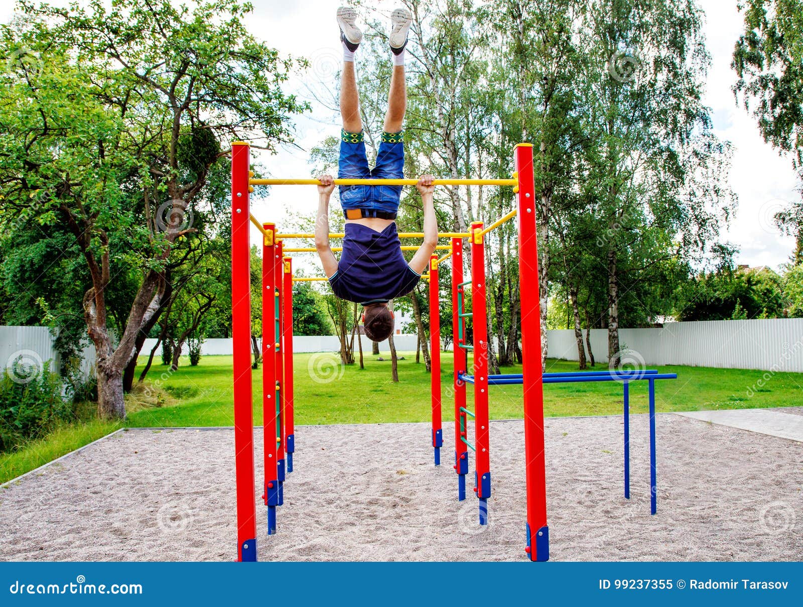 Young Man is Practicing on a Horizontal Bar Stock Image - Image of ...