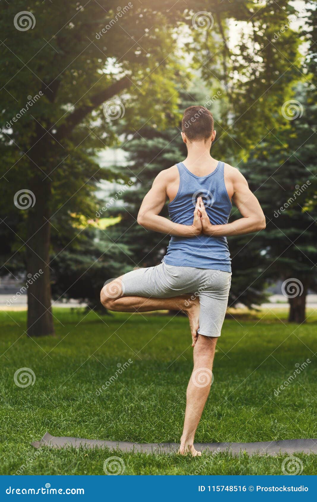 Young Man Practicing Yoga, Reverse Prayer Pose Stock Photo - Image of ...