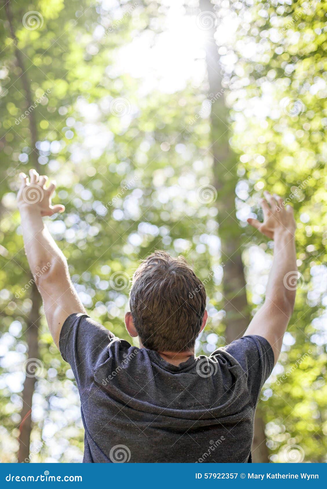 Young man praise stock image. Image of christ, back, lord - 57922357