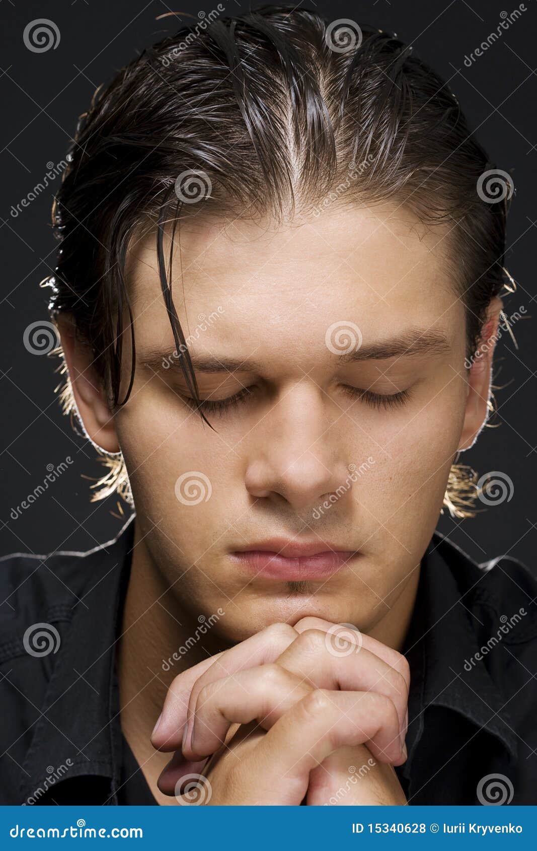 Young man praying stock photo. Image of faith, grief - 15340628