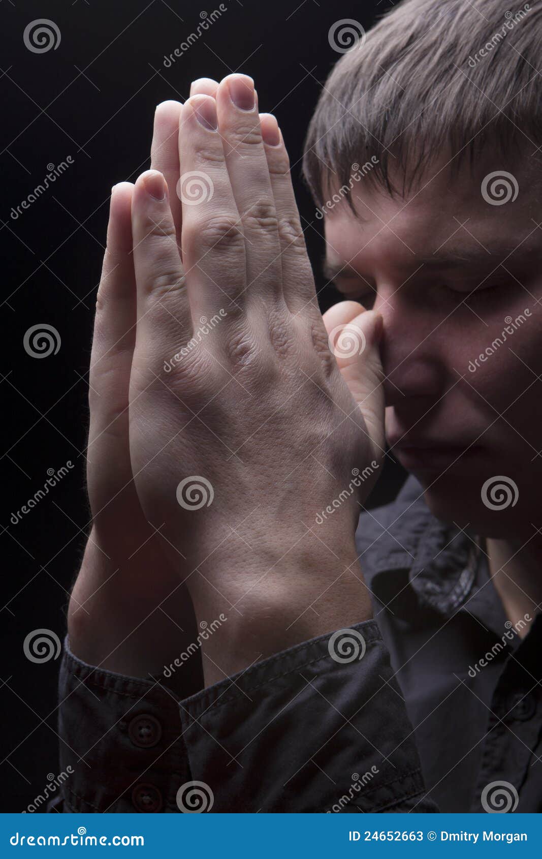 Young man praying stock image. Image of handsome, black - 24652663