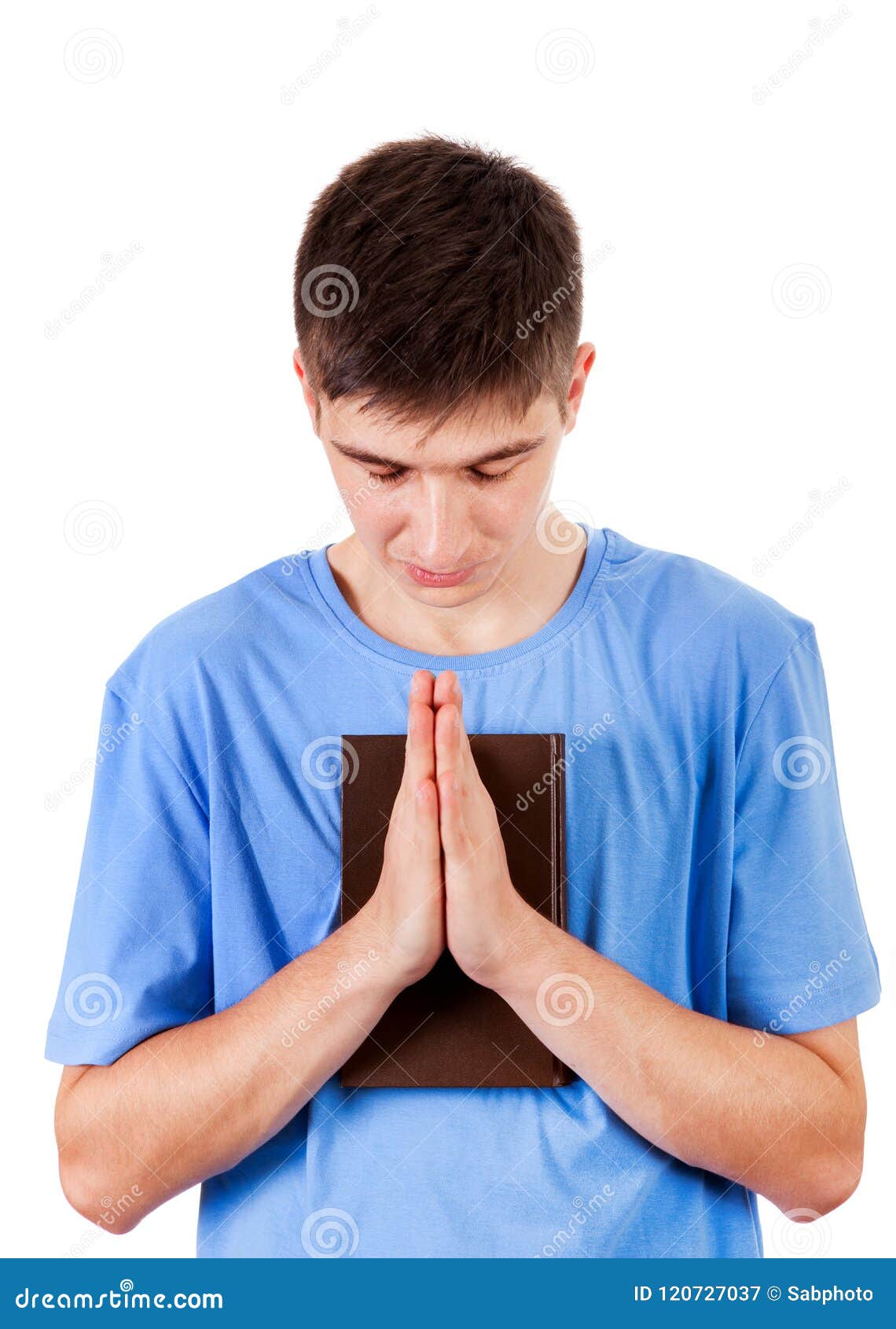 Young Man praying stock image. Image of book, cute, read - 120727037