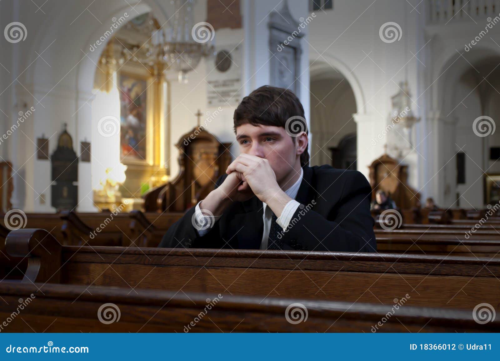 Young Man Praying in Church Stock Photo - Image of ceremony, belive ...