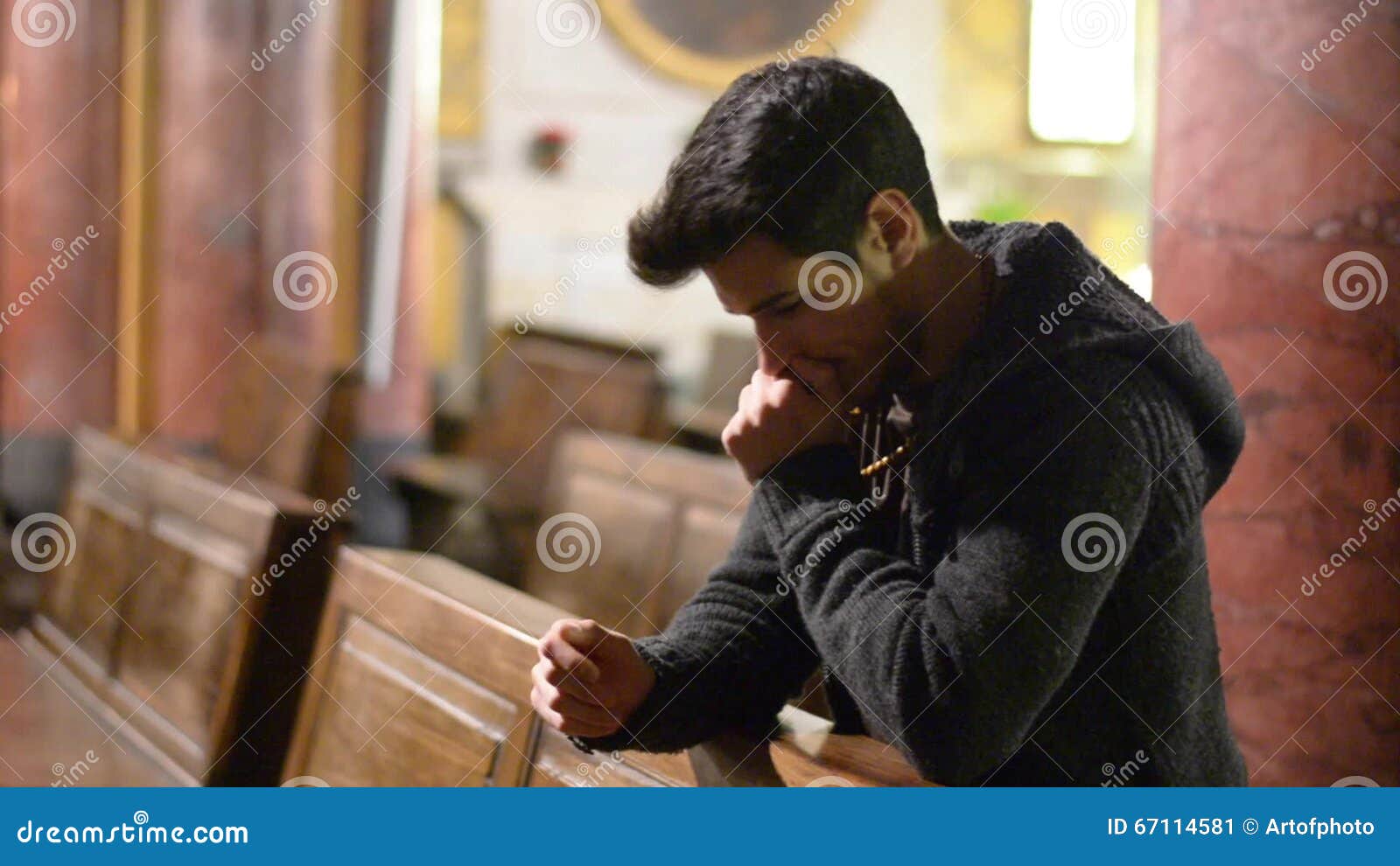 Young Man Praying in Church Stock Video - Video of religion, male: 67114581