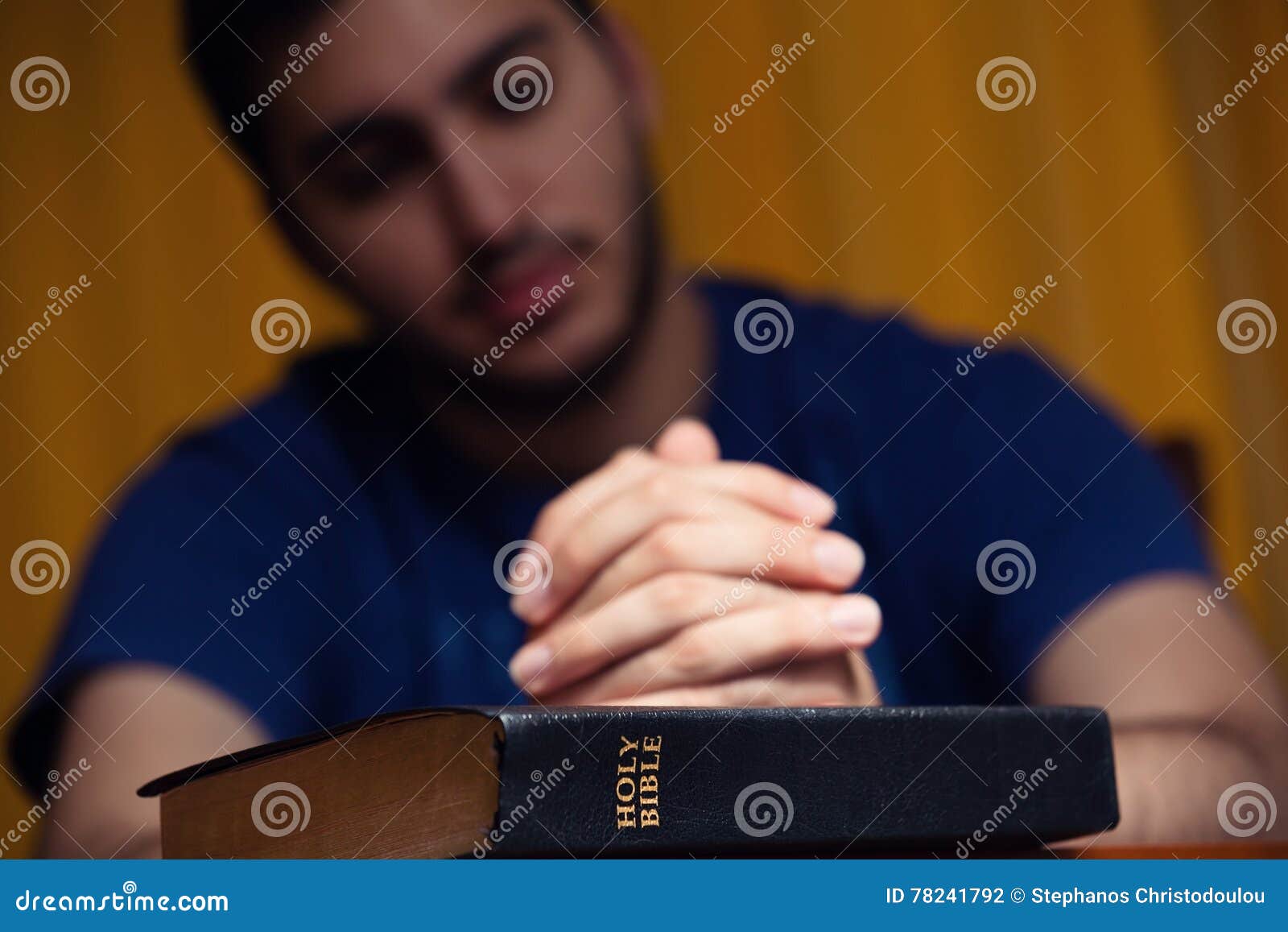 Young Man Praying on Holy Bible Stock Photo - Image of white, wisdom ...