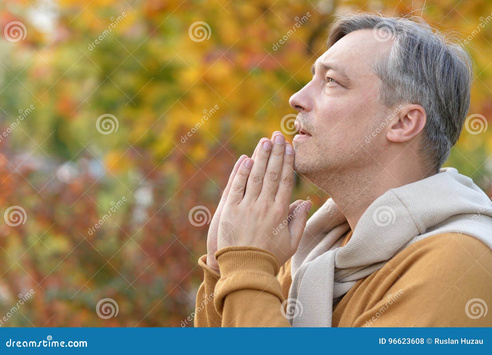 Young man praying stock photo. Image of holiday, sign - 96623608