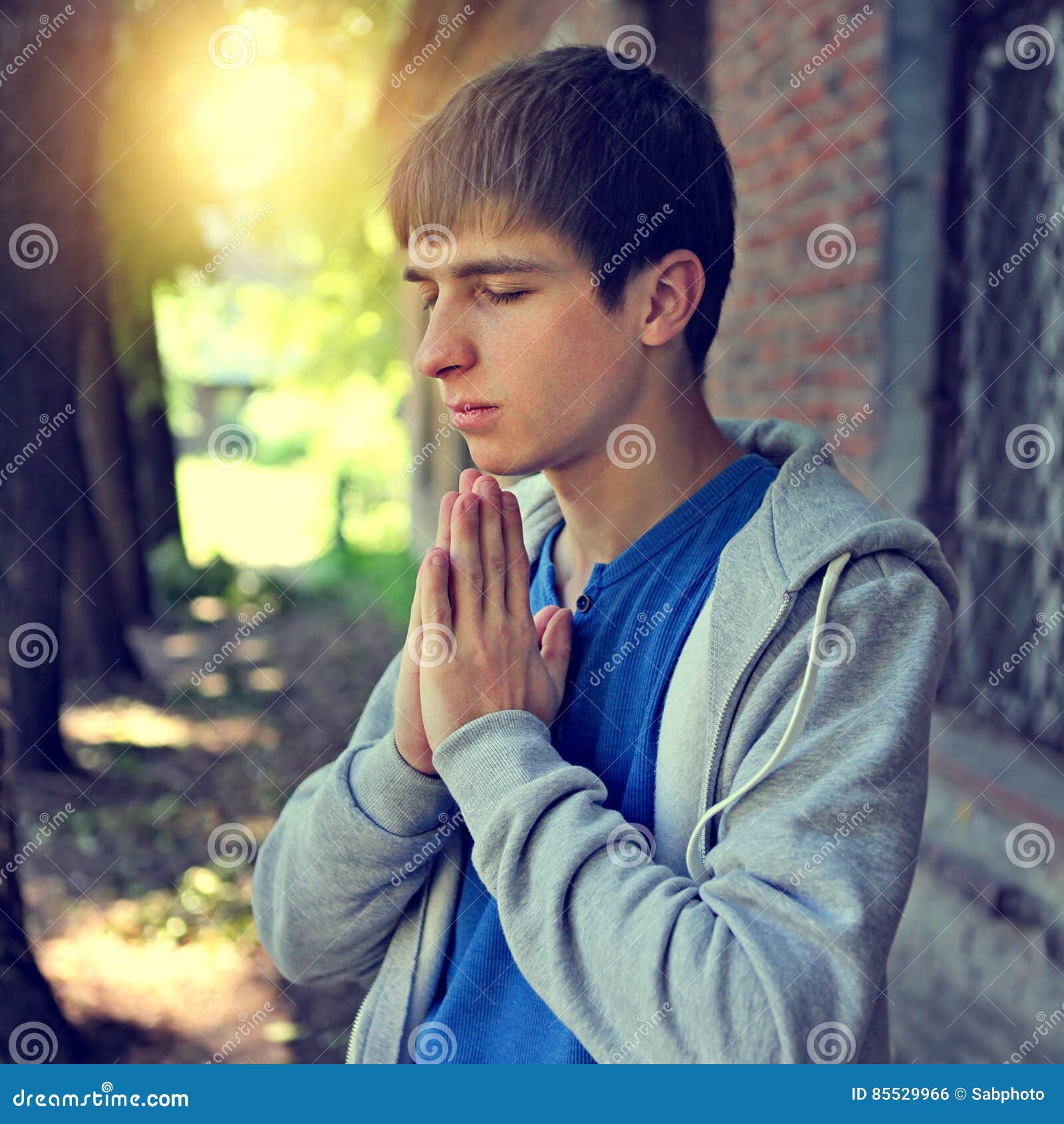 Young Man praying stock photo. Image of prayer, prison - 85529966