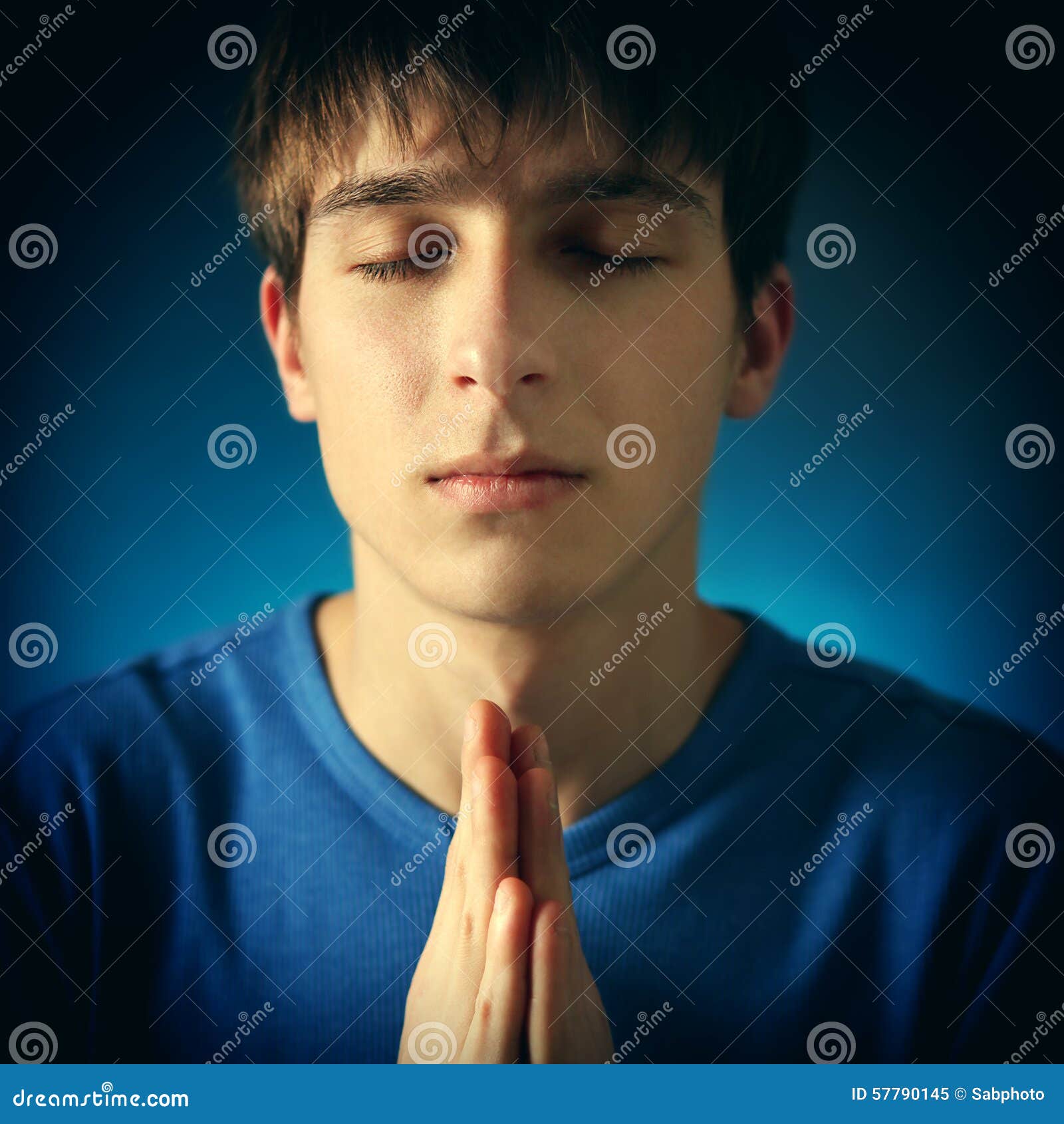 Young Man praying stock image. Image of praying, confidence - 57790145