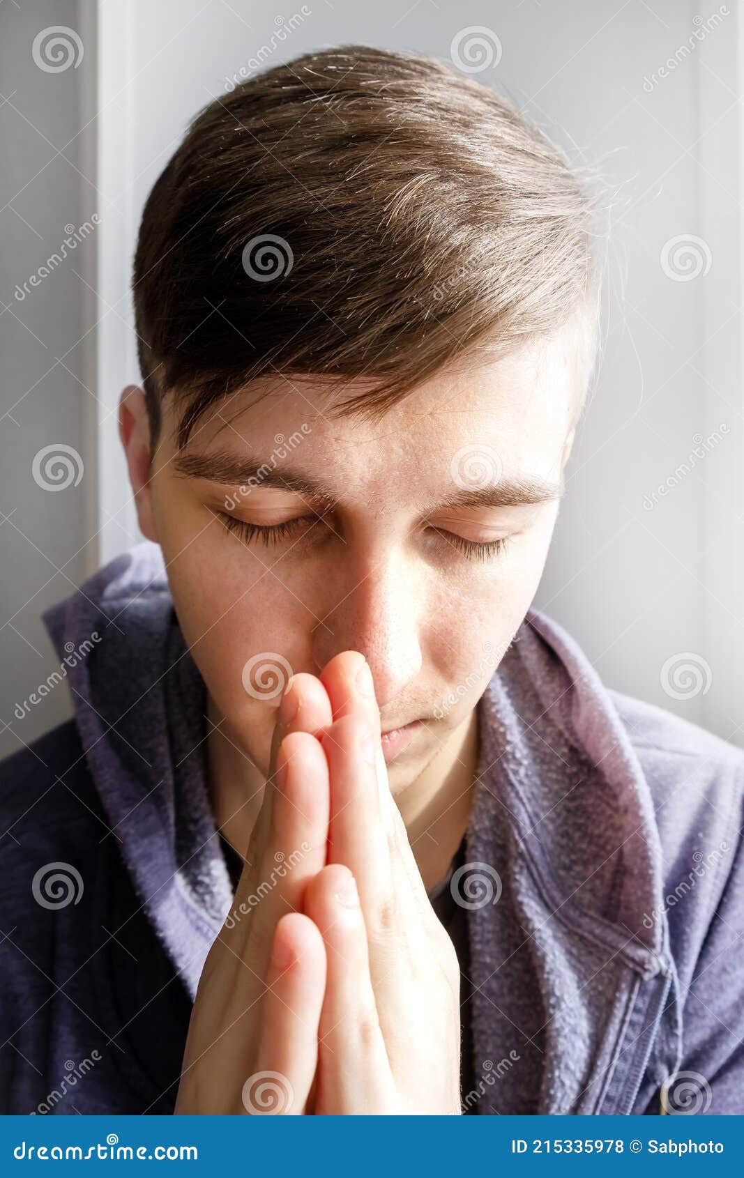 Young Man praying stock photo. Image of prayer, entreaty - 215335978