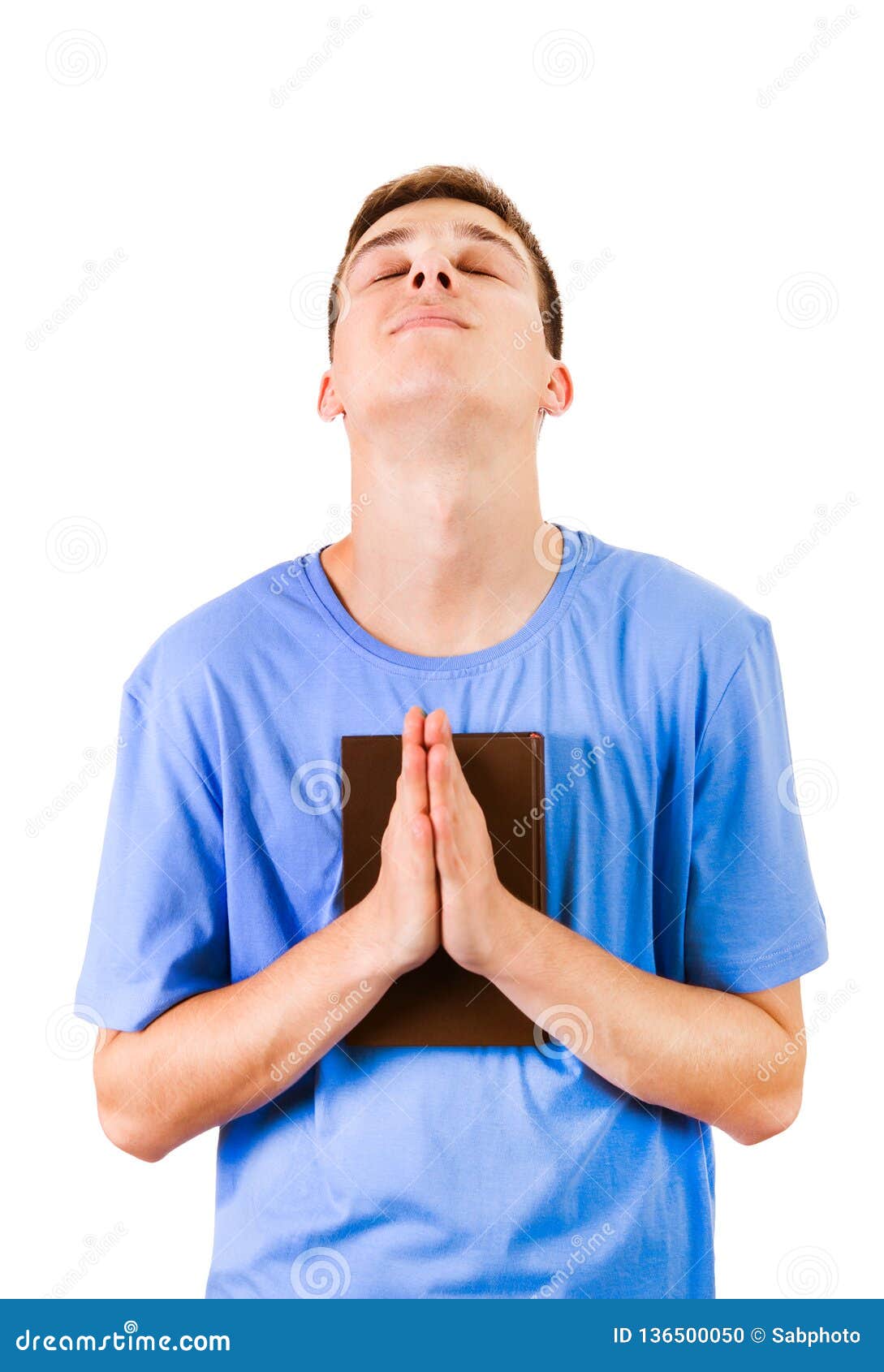 Young Man praying stock photo. Image of palms, bible - 136500050