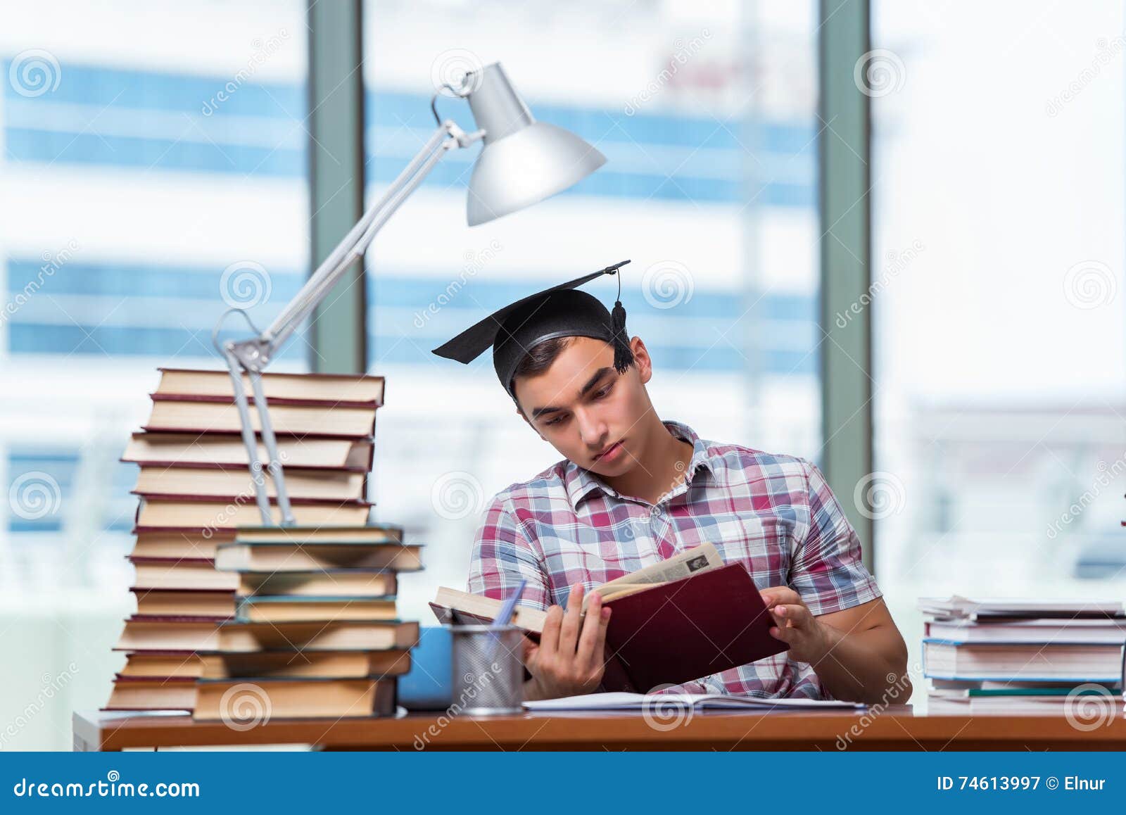 The Young Man Preparing for Graduation Exams in College Stock Image ...