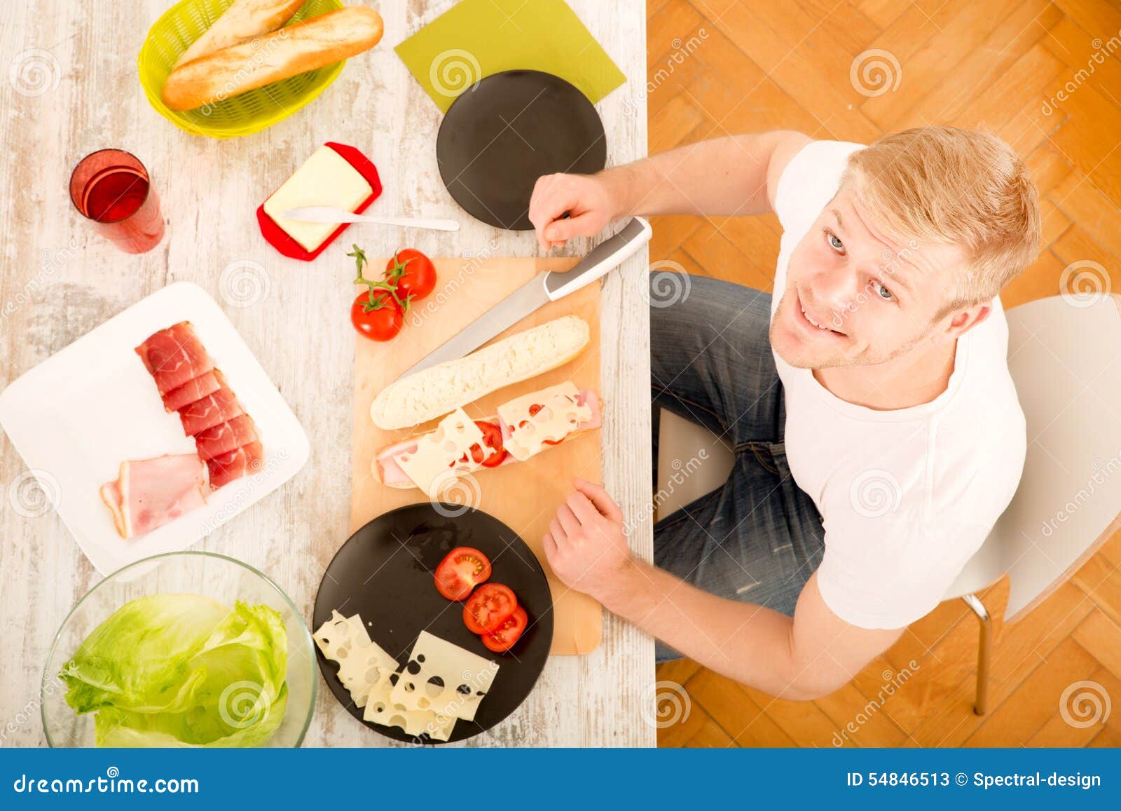 Young Man Preparing a Sandwich Stock Image - Image of ingredients ...