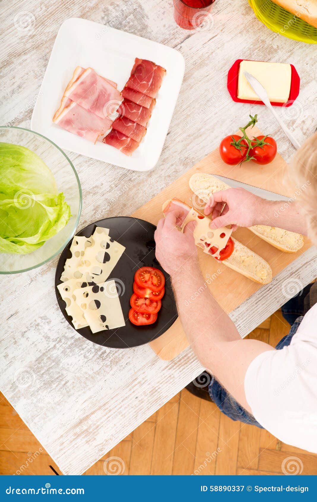Young Man Preparing a Sandwich Stock Image - Image of kitchen, bread ...