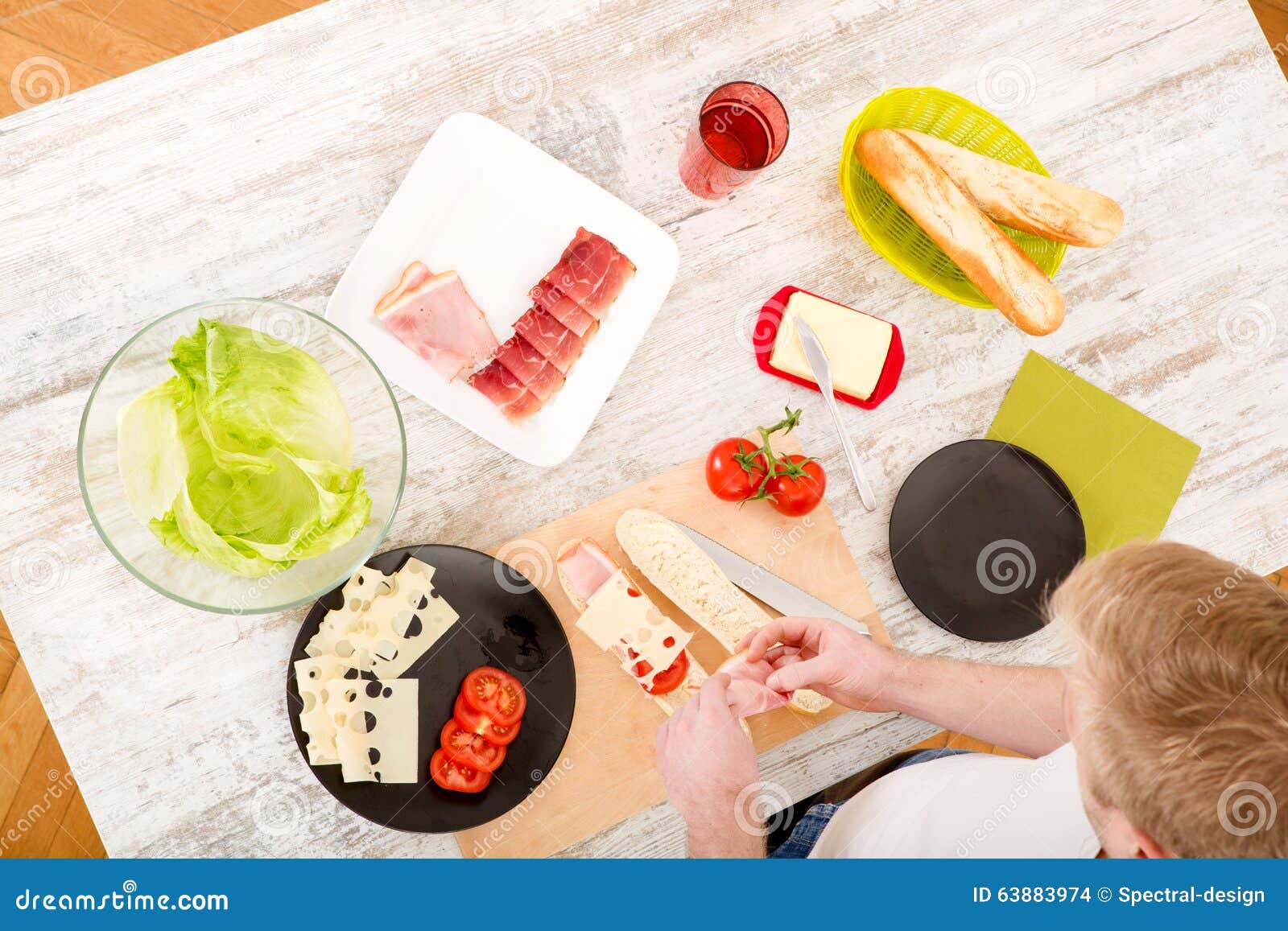 Young Man Preparing a Sandwich Stock Photo - Image of bacon, delicious ...