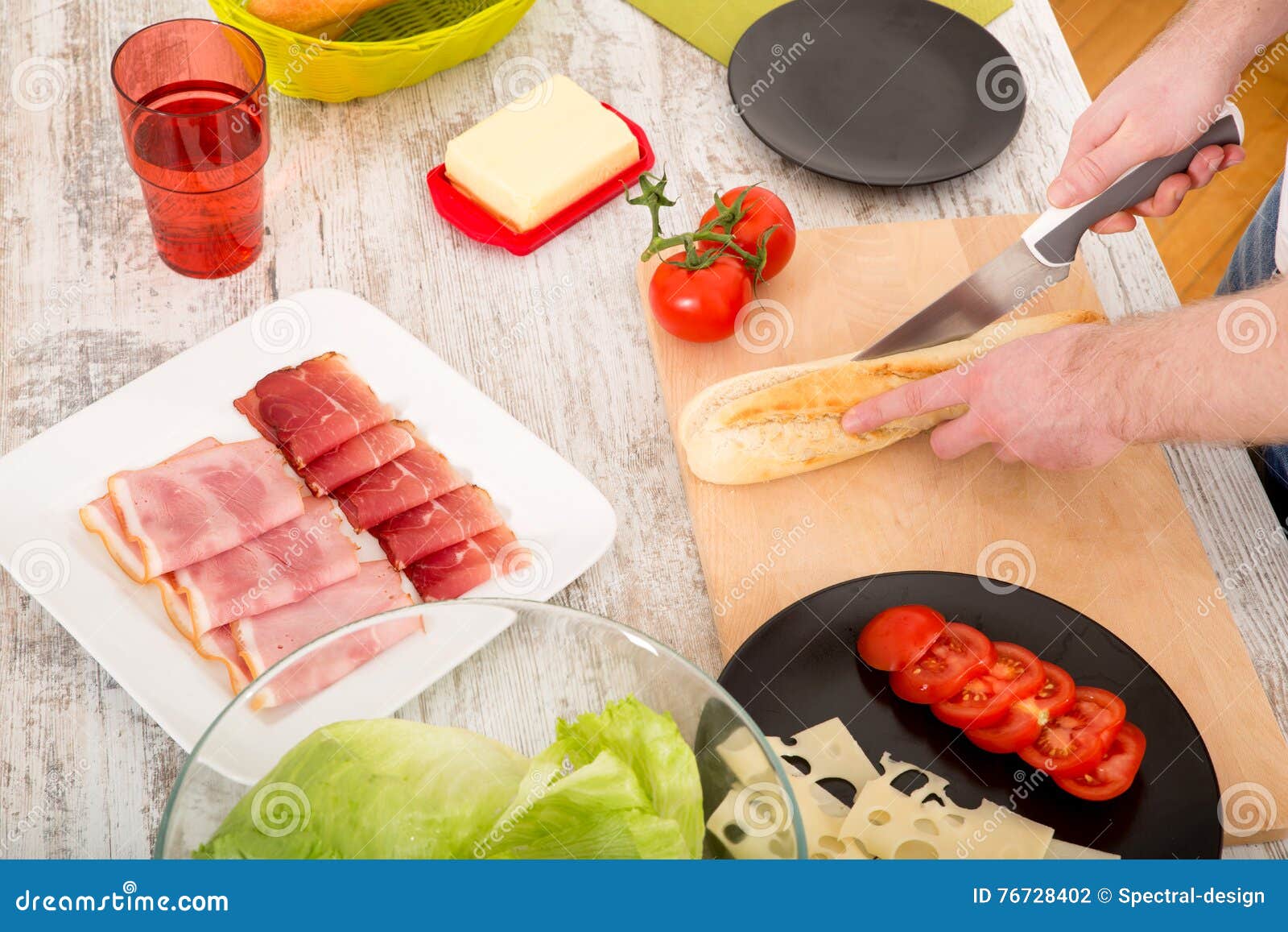 Young Man Preparing a Sandwich Stock Photo - Image of delicious ...