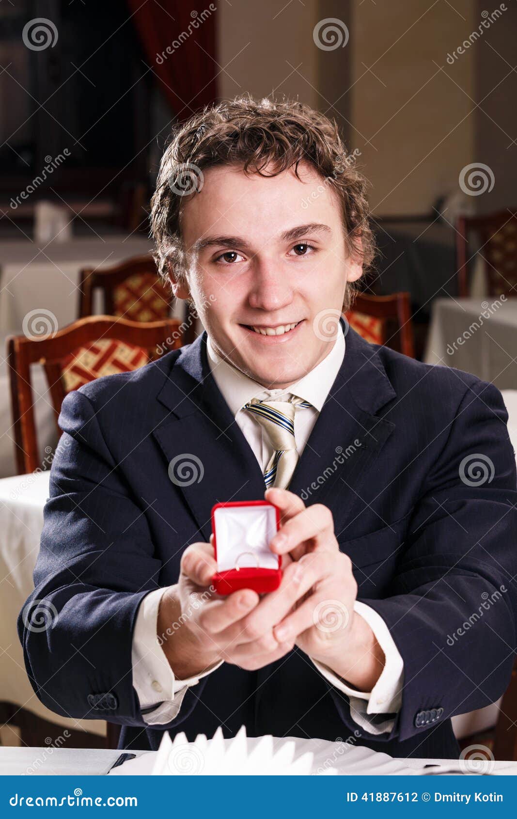 Young man stock photo. Image of excitement, holding, giving - 41887612